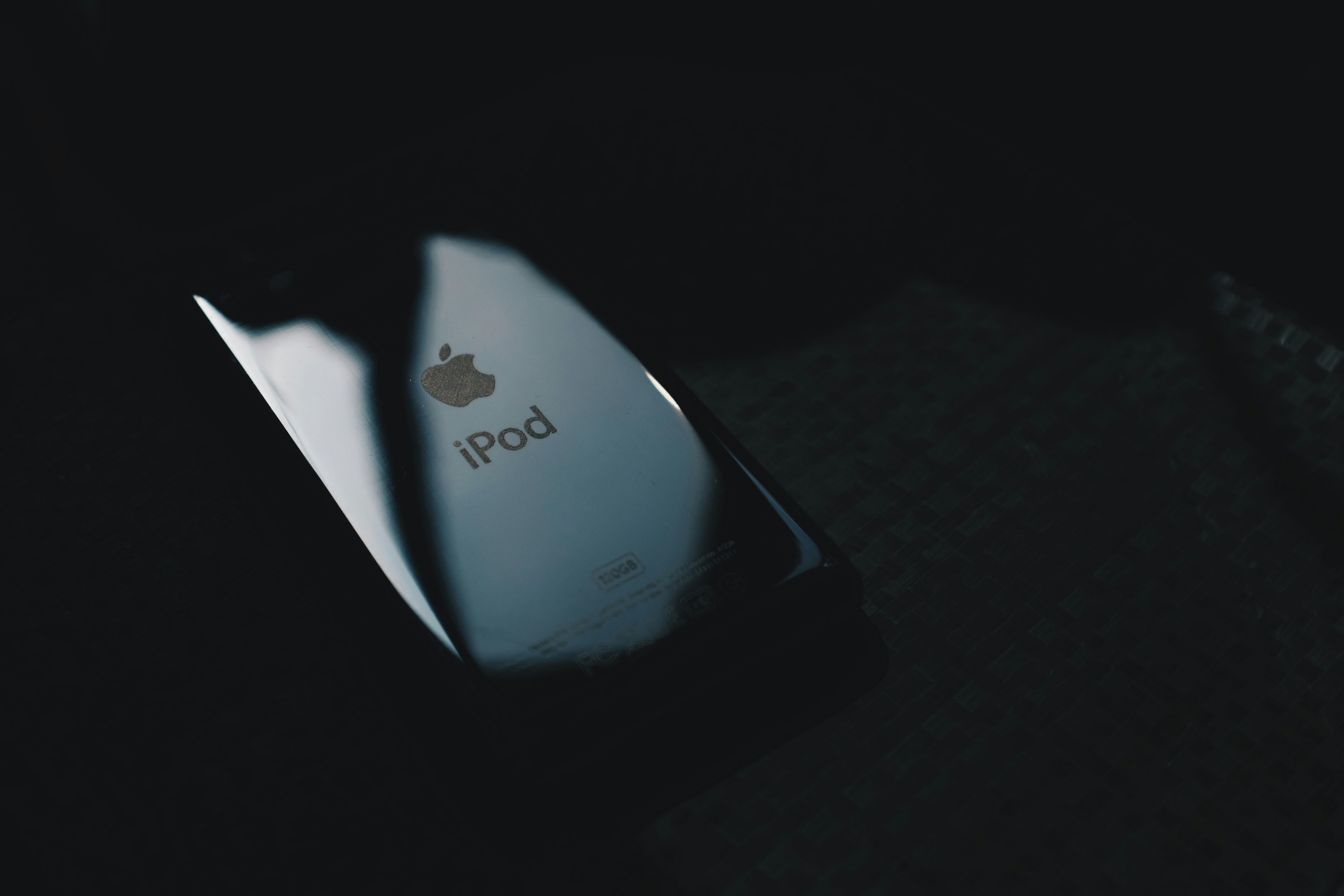 Shattered Reflection: An iPod Halved by Light