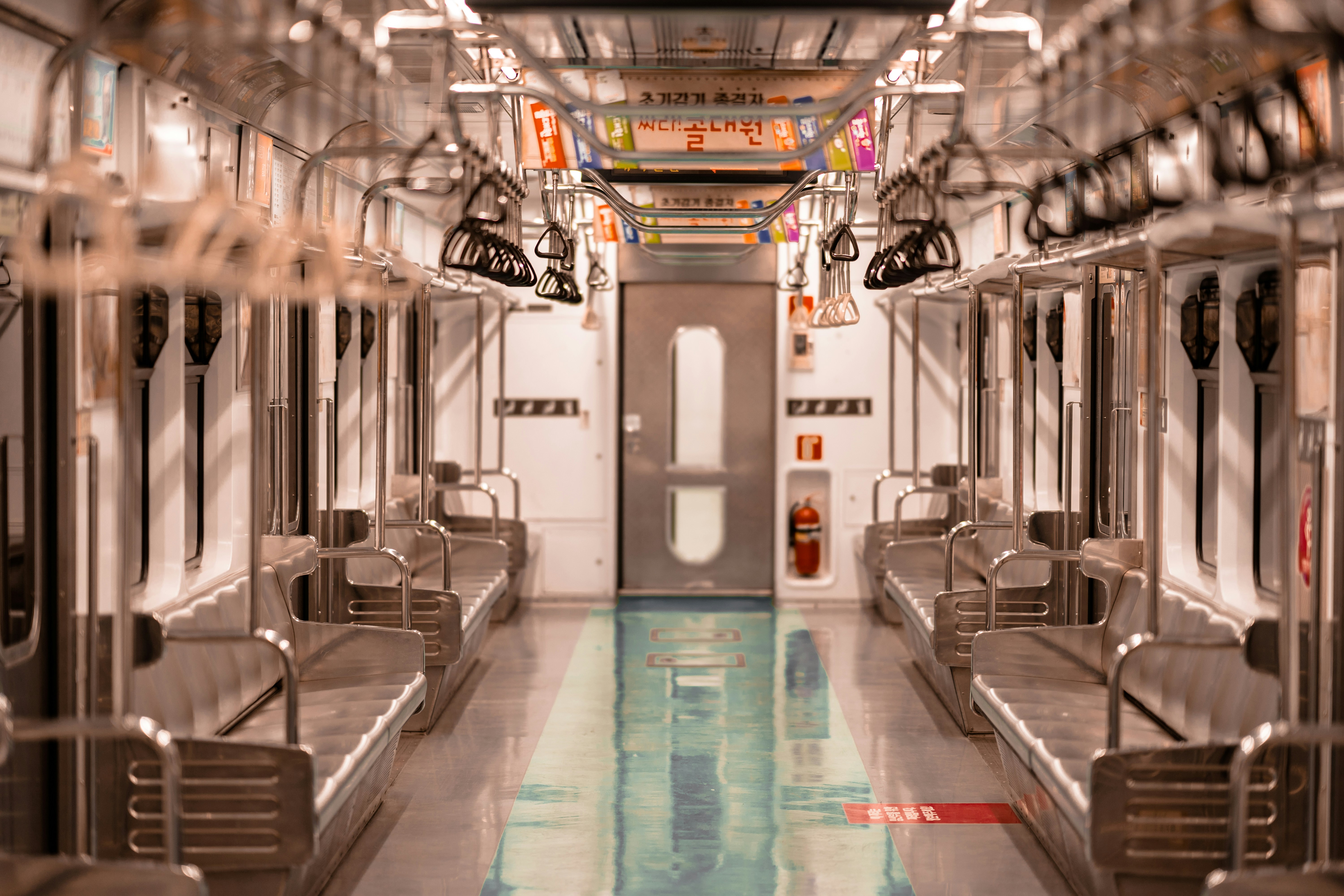 Central Aisle: A Quiet Ride Through a Symmetrical Subway Car