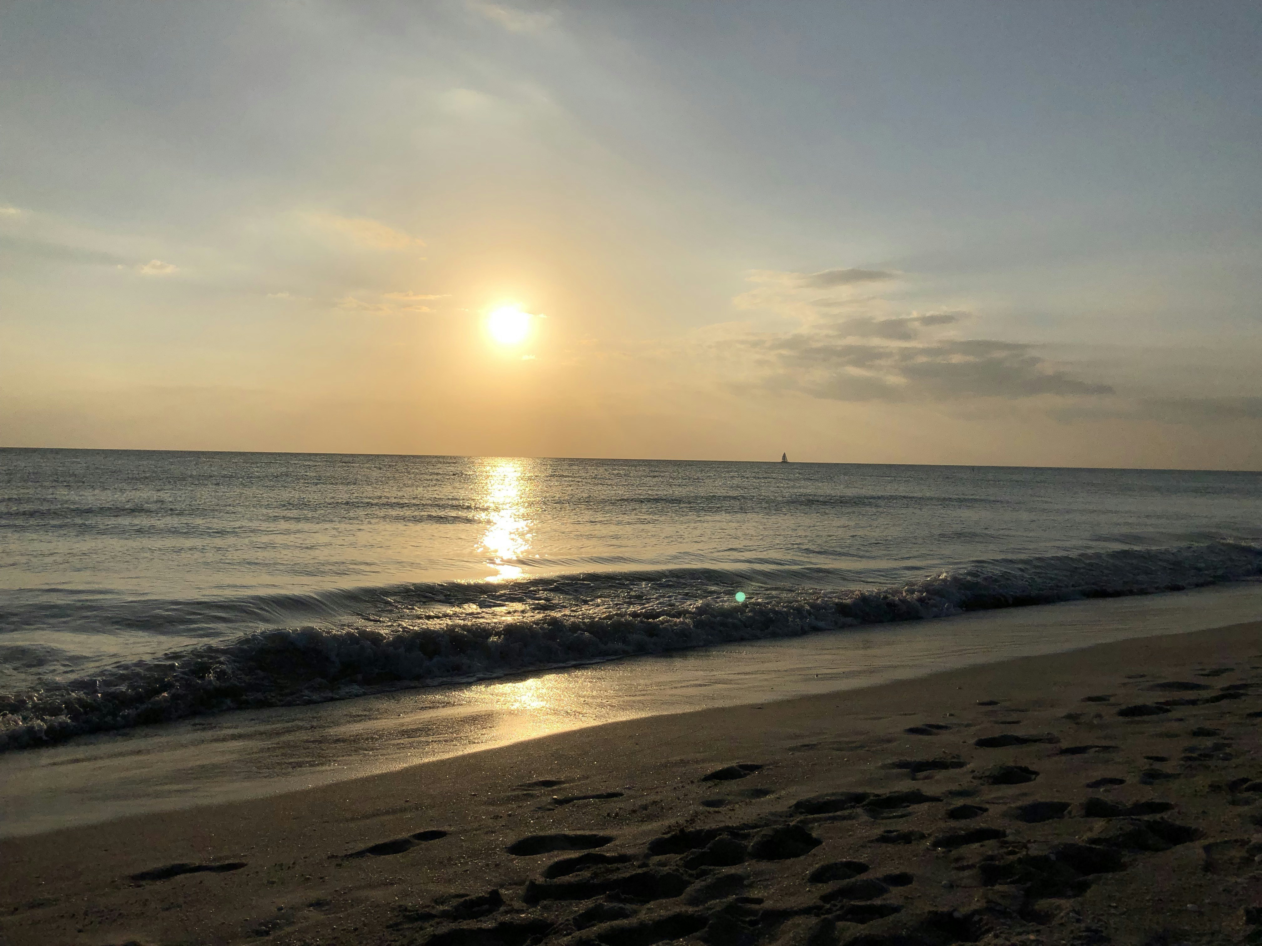 Sunlit Ribbon on a Quiet Beach at Dusk