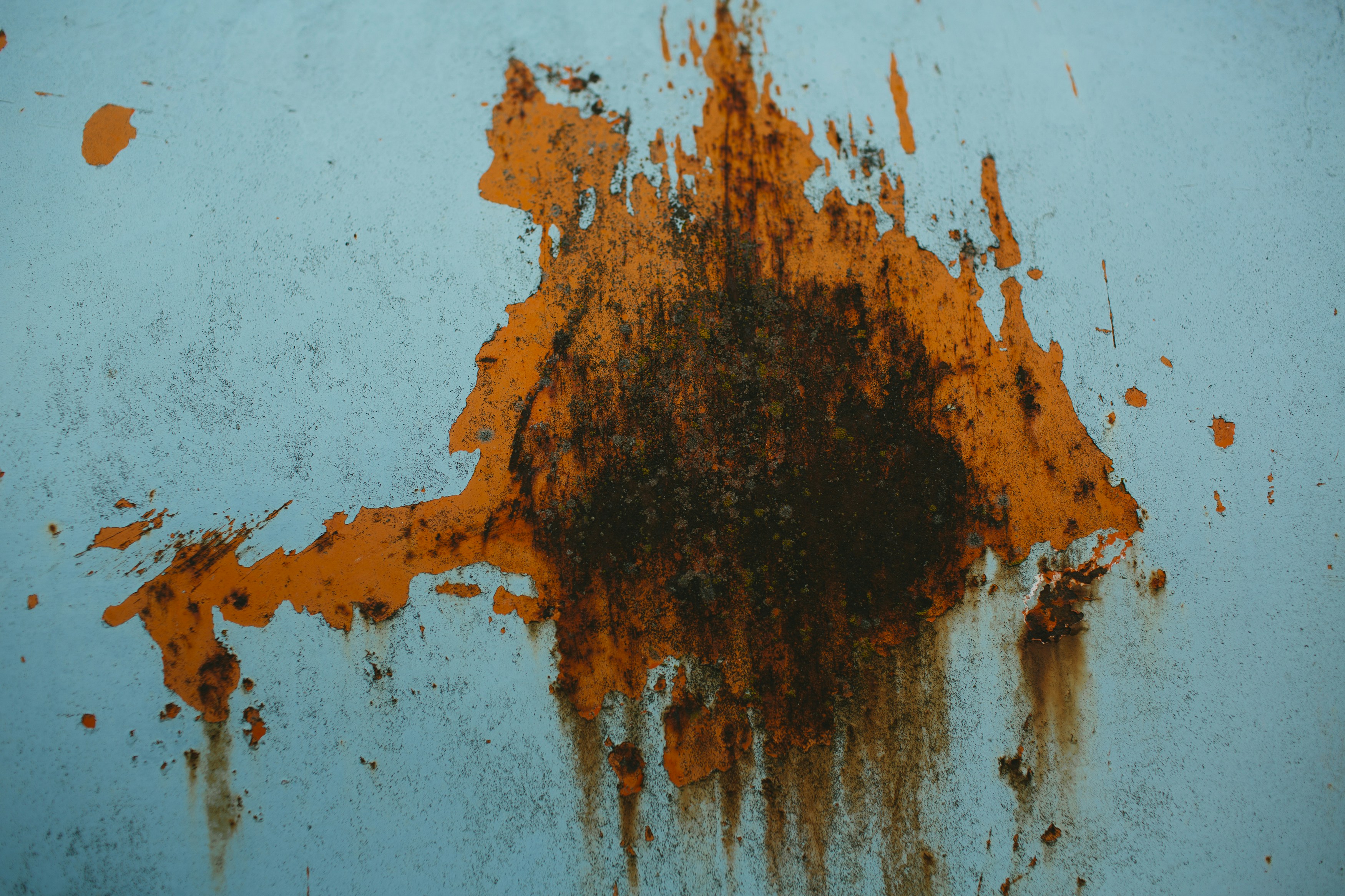 Bright blue orange rusty metal background texture