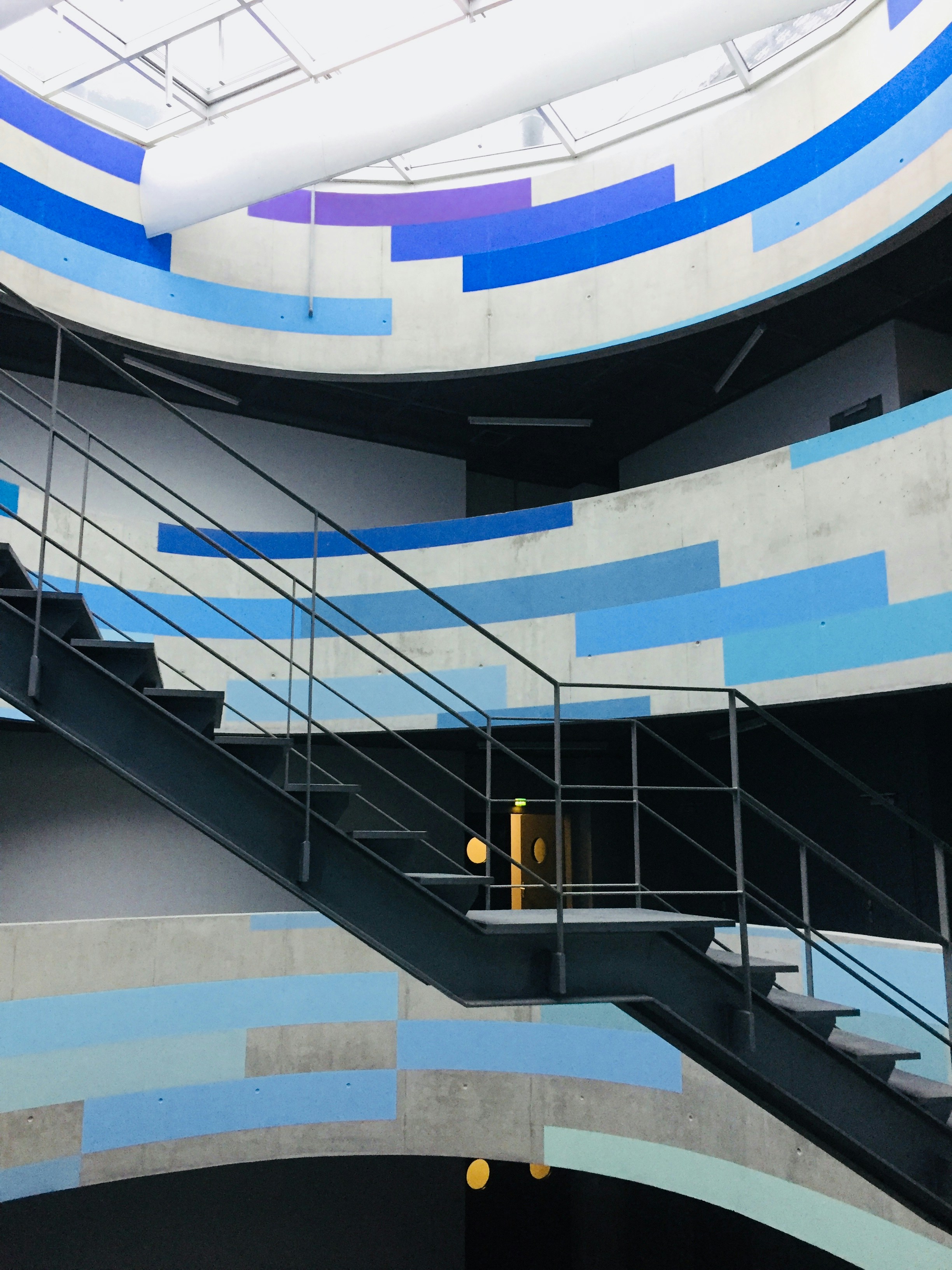 Yellow Door in a Blue Spiral Atrium
