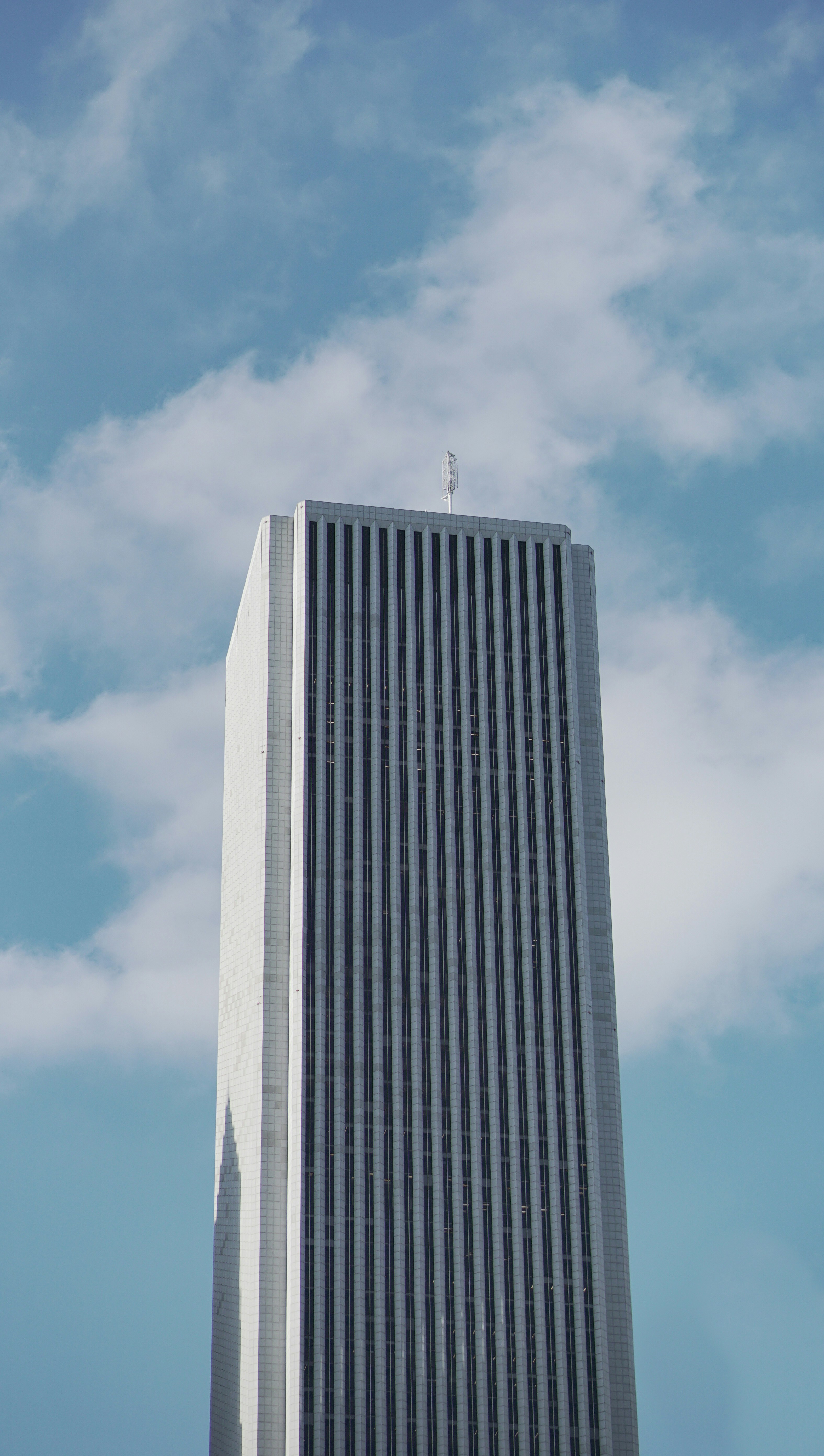 Cobalt Colossus Rising Against a Clear Azure Sky