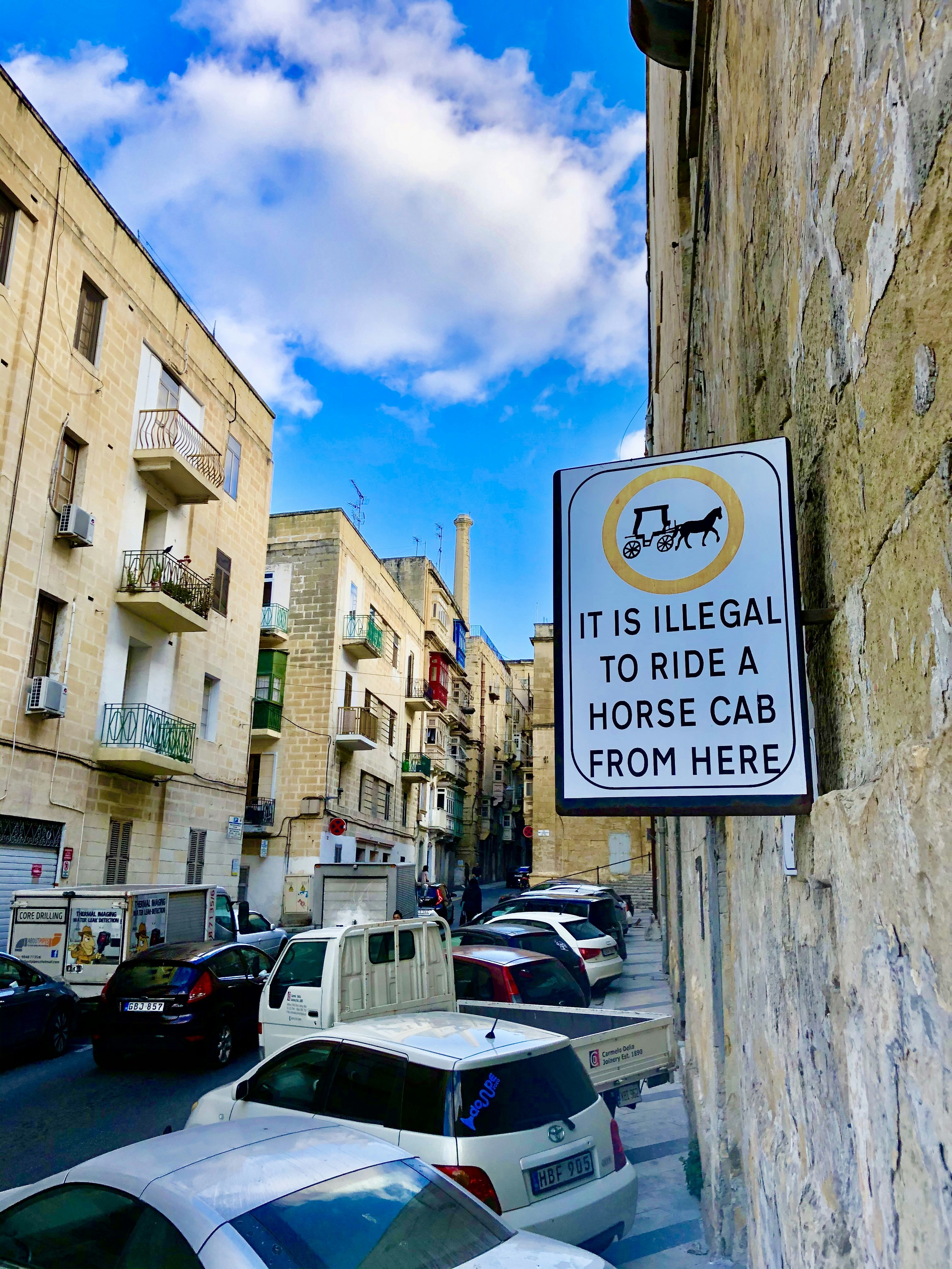 White and blue street sign photo – Free Malta Image on Unsplash