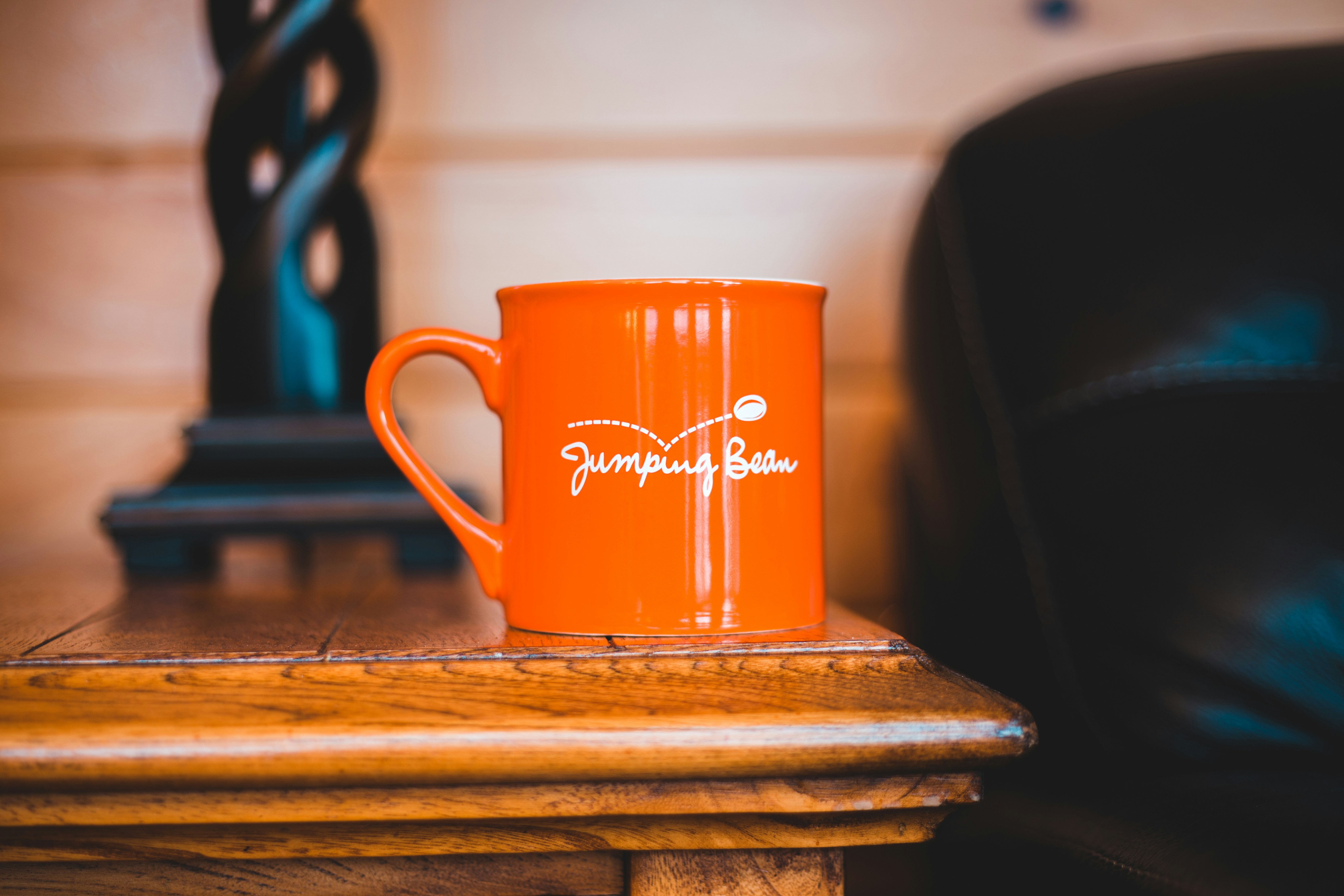 Jumping Bean Mug: A Quiet Moment on Weathered Wood
