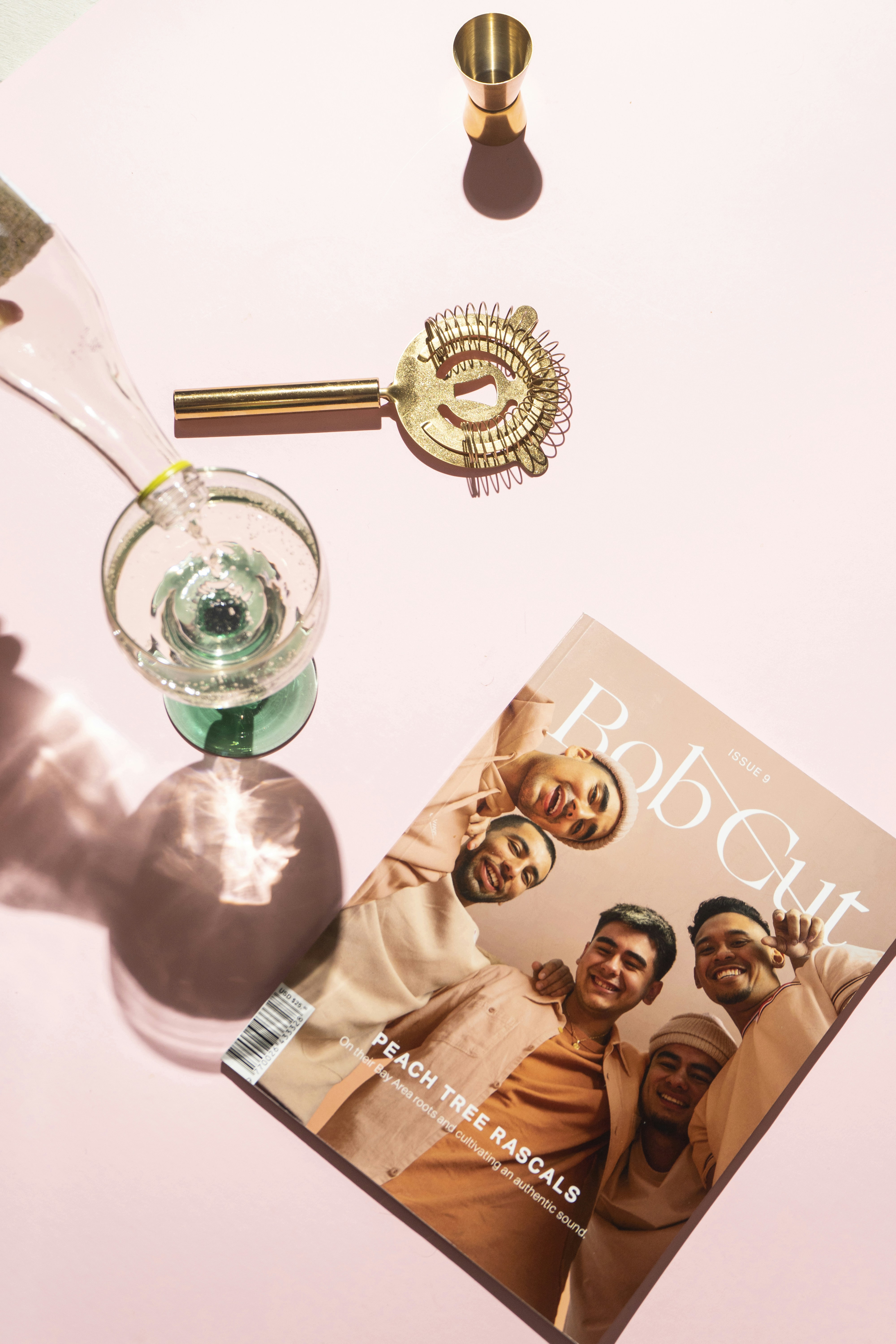 Pastel Quiet: A Fashion Magazine Still Life with Glass Pour