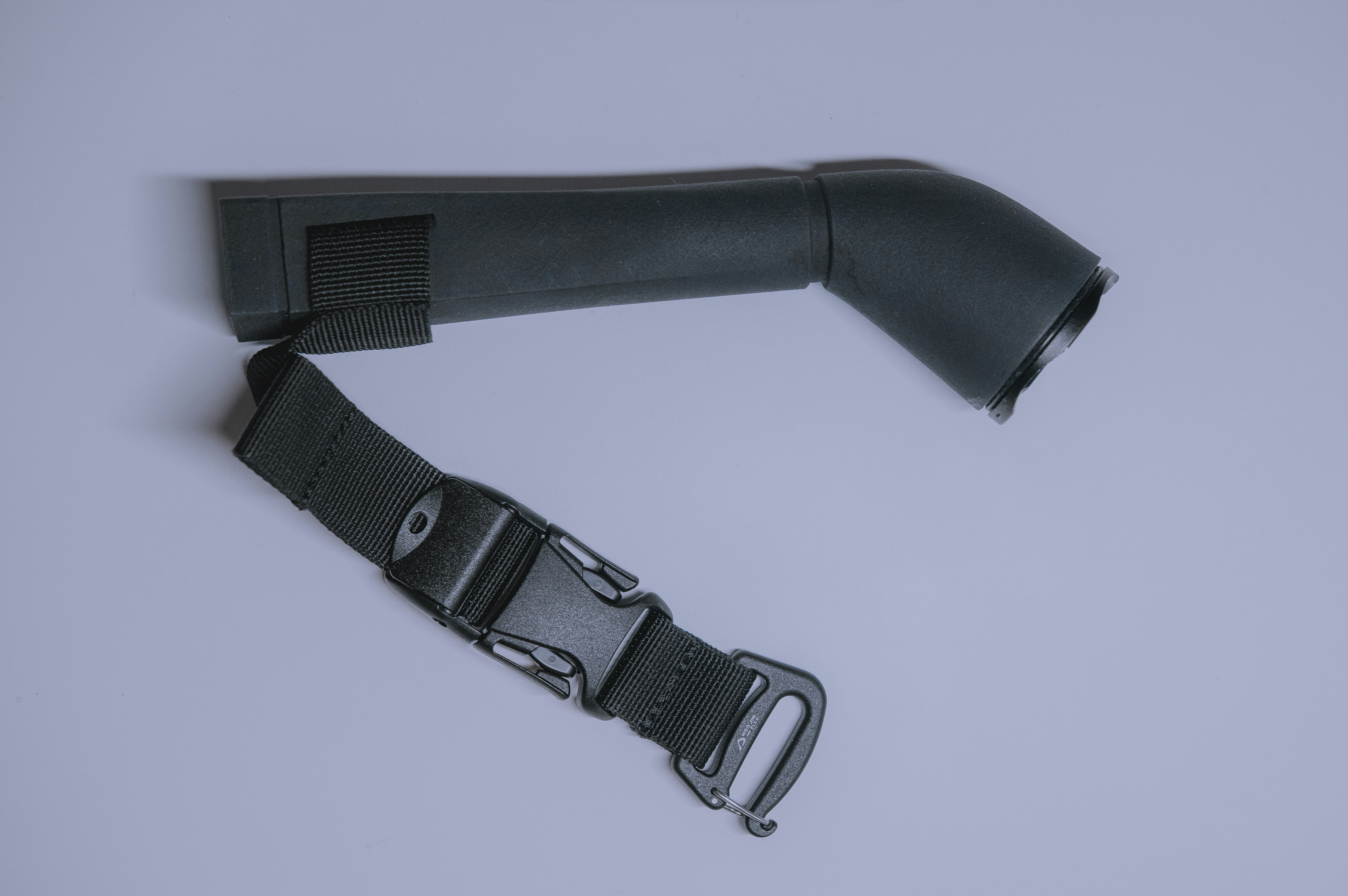 Black strap on white surface photo – Free Grey Image on Unsplash