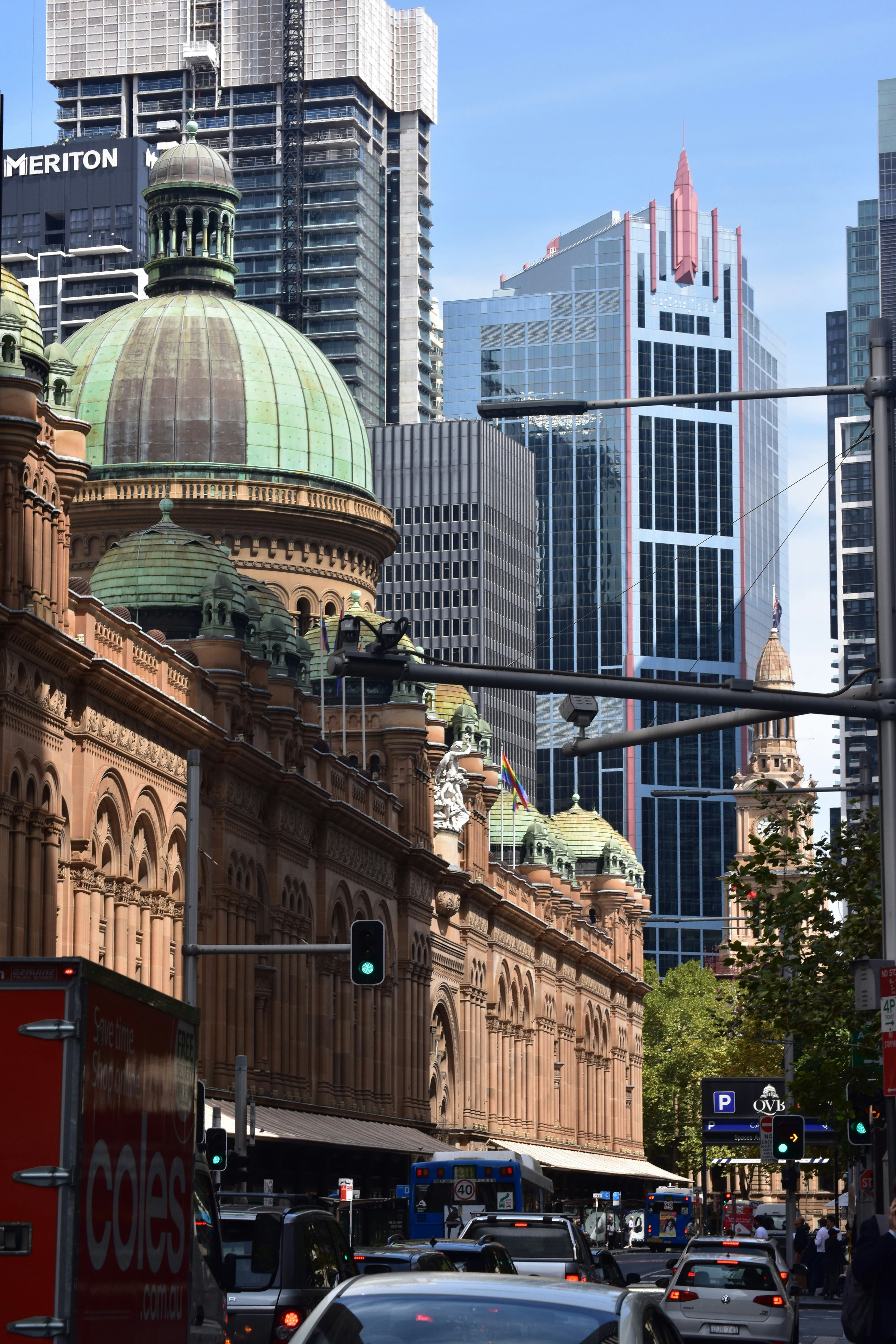 Historic architecture of a grand building juxtaposed against a backdrop of contemporary skyscrapers. The scene captures the essence of urban evolution.
