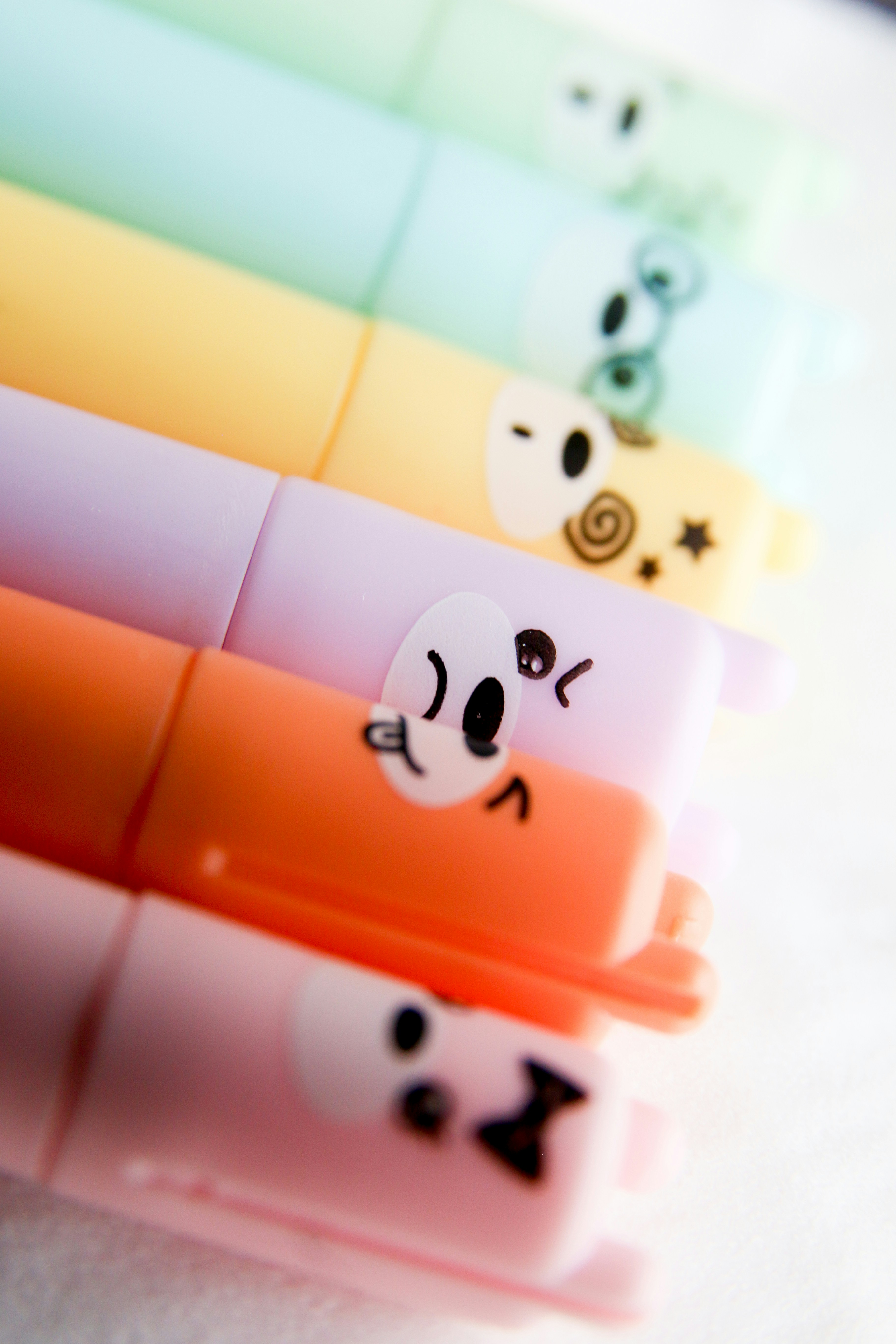 orange white and yellow plastic toy