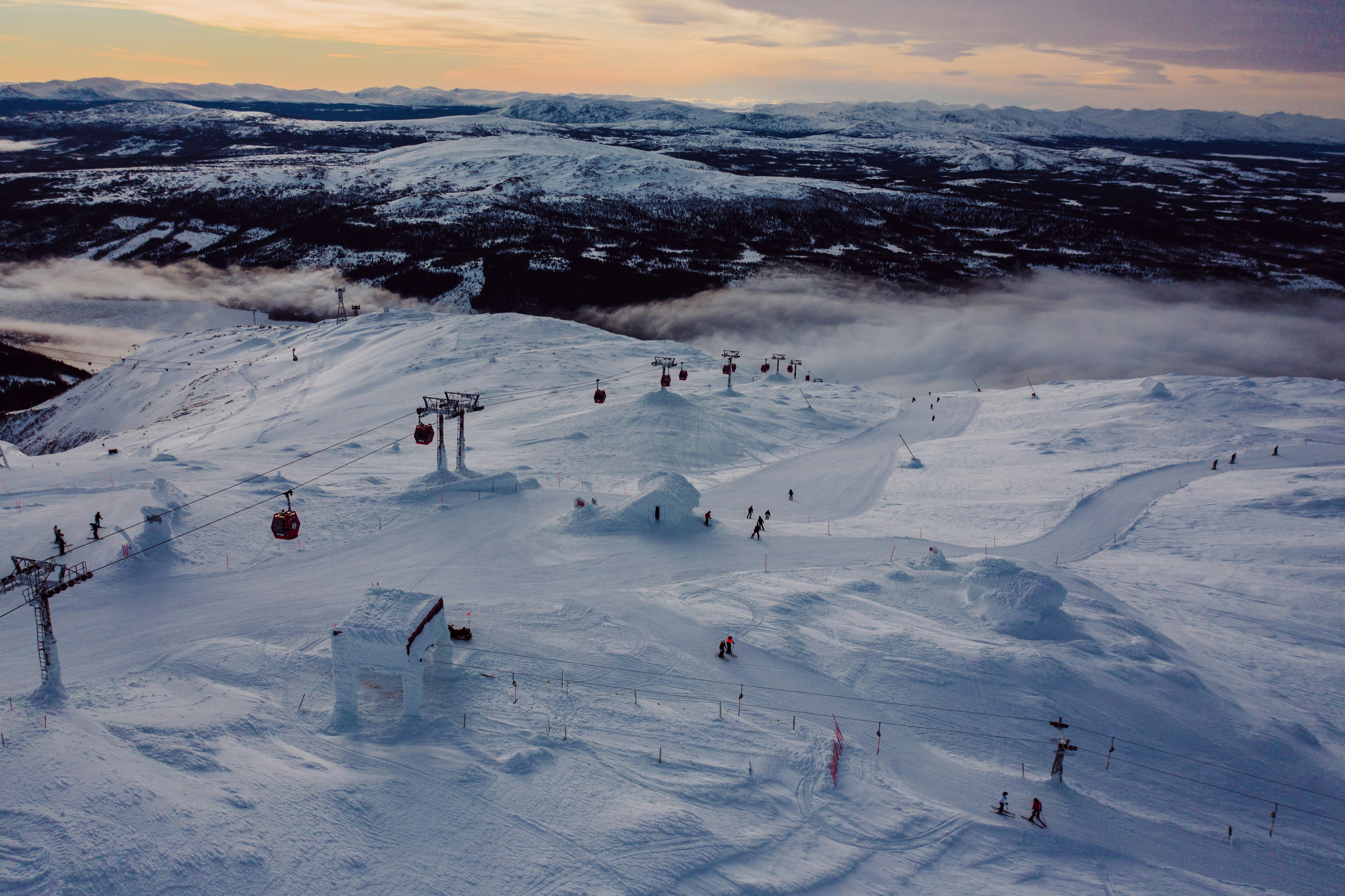 Snow Wave Park at Dusk: A Skyward Symphony of Slopes and Chairlifts
