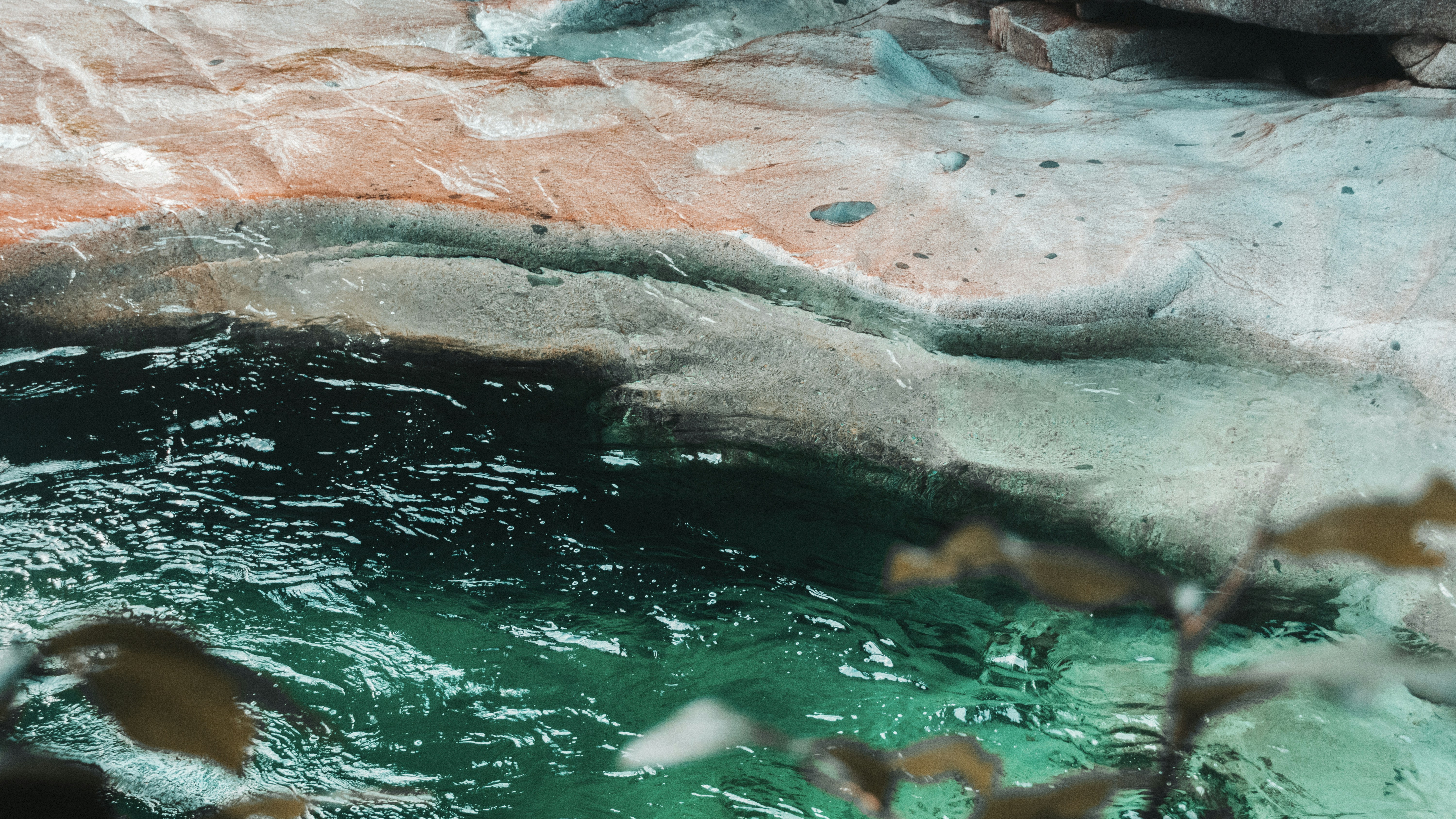 Emerald Pool in a Weathered Rock Alcove
