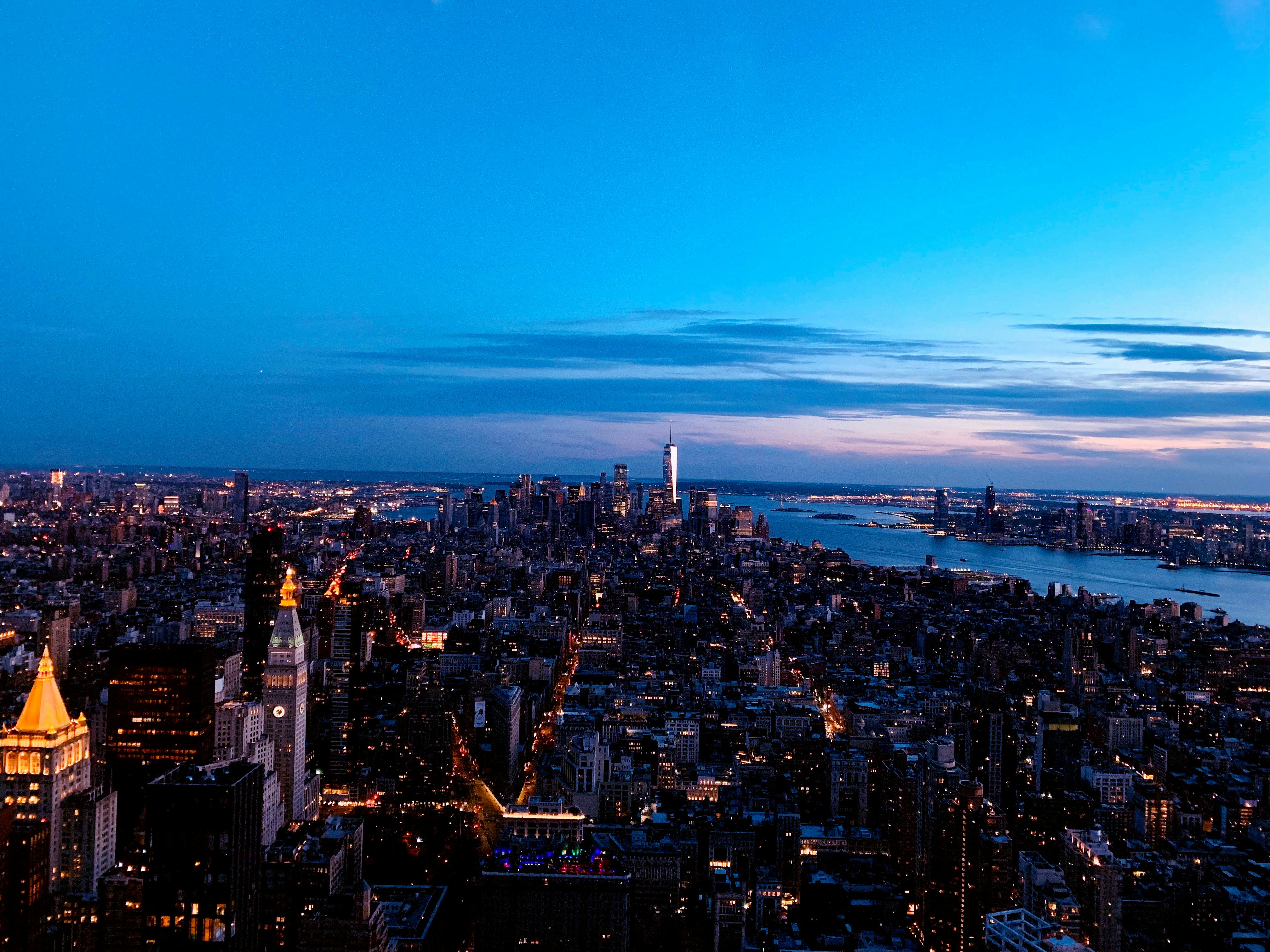 Aerial view of city buildings during night time photo – Free Building ...