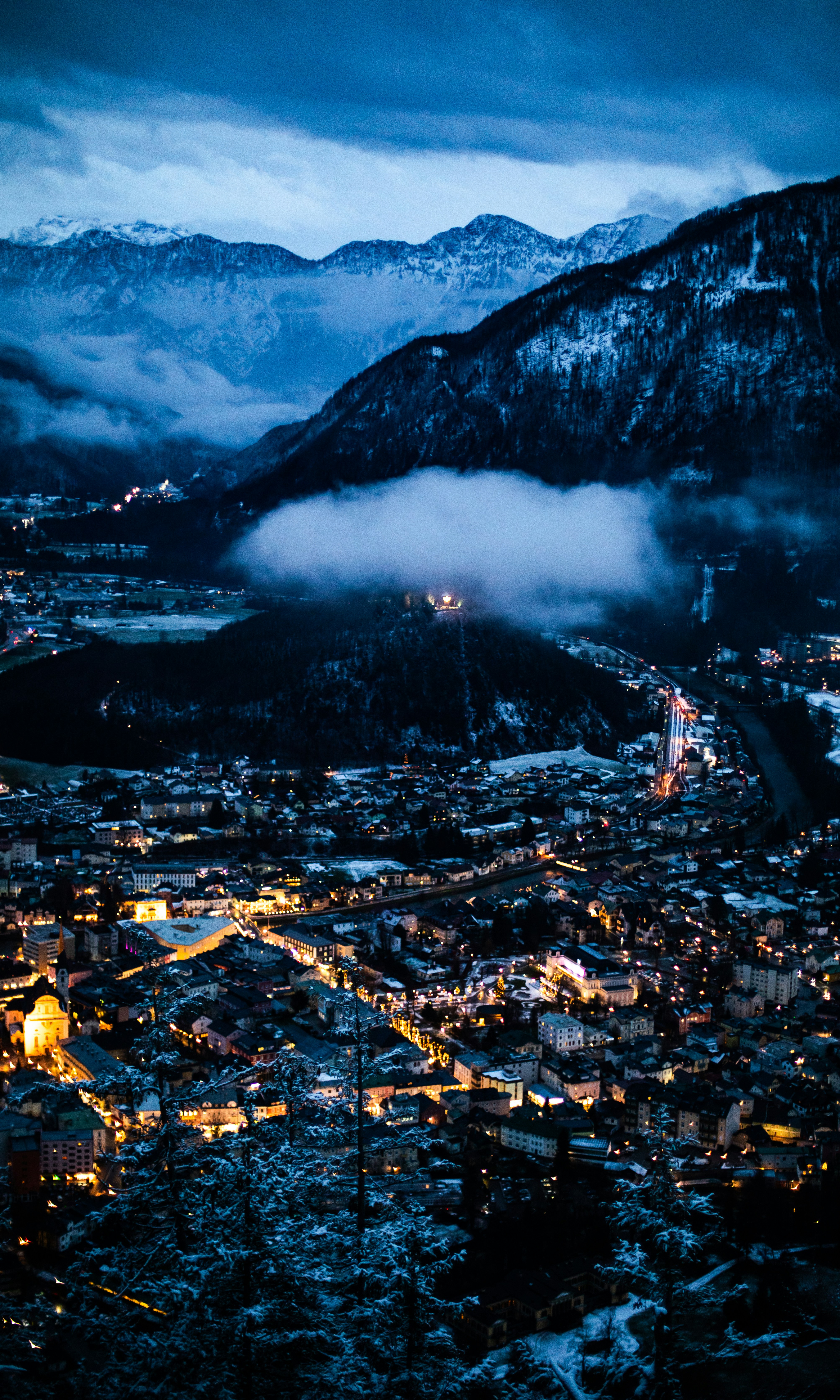 Blue Hour Luminaries Over Snowbound Alpine Valley