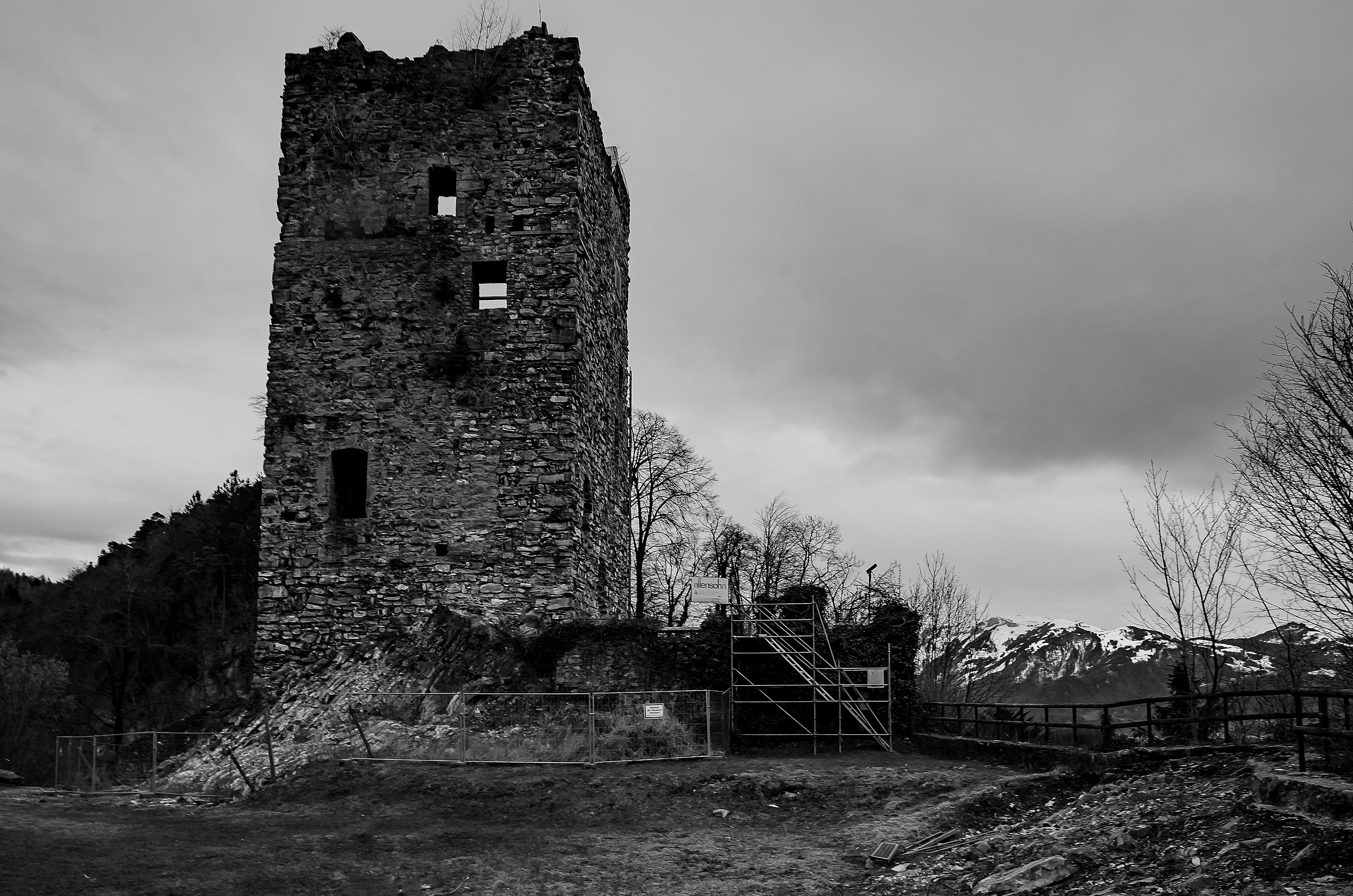 Grayscale photo of brick building photo – Free Götzis Image on Unsplash