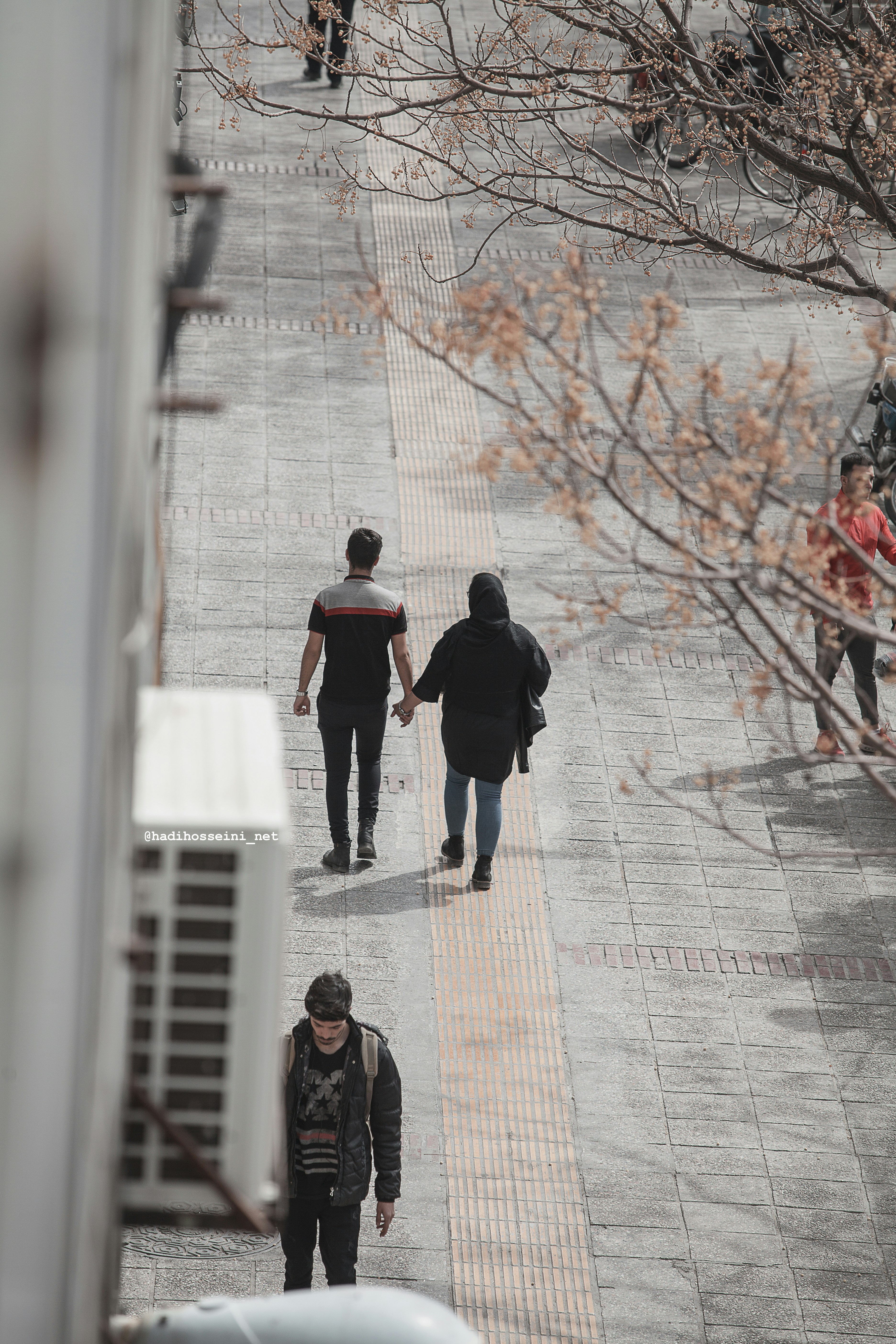 Two on the Tiled Path: A Quiet City Moment