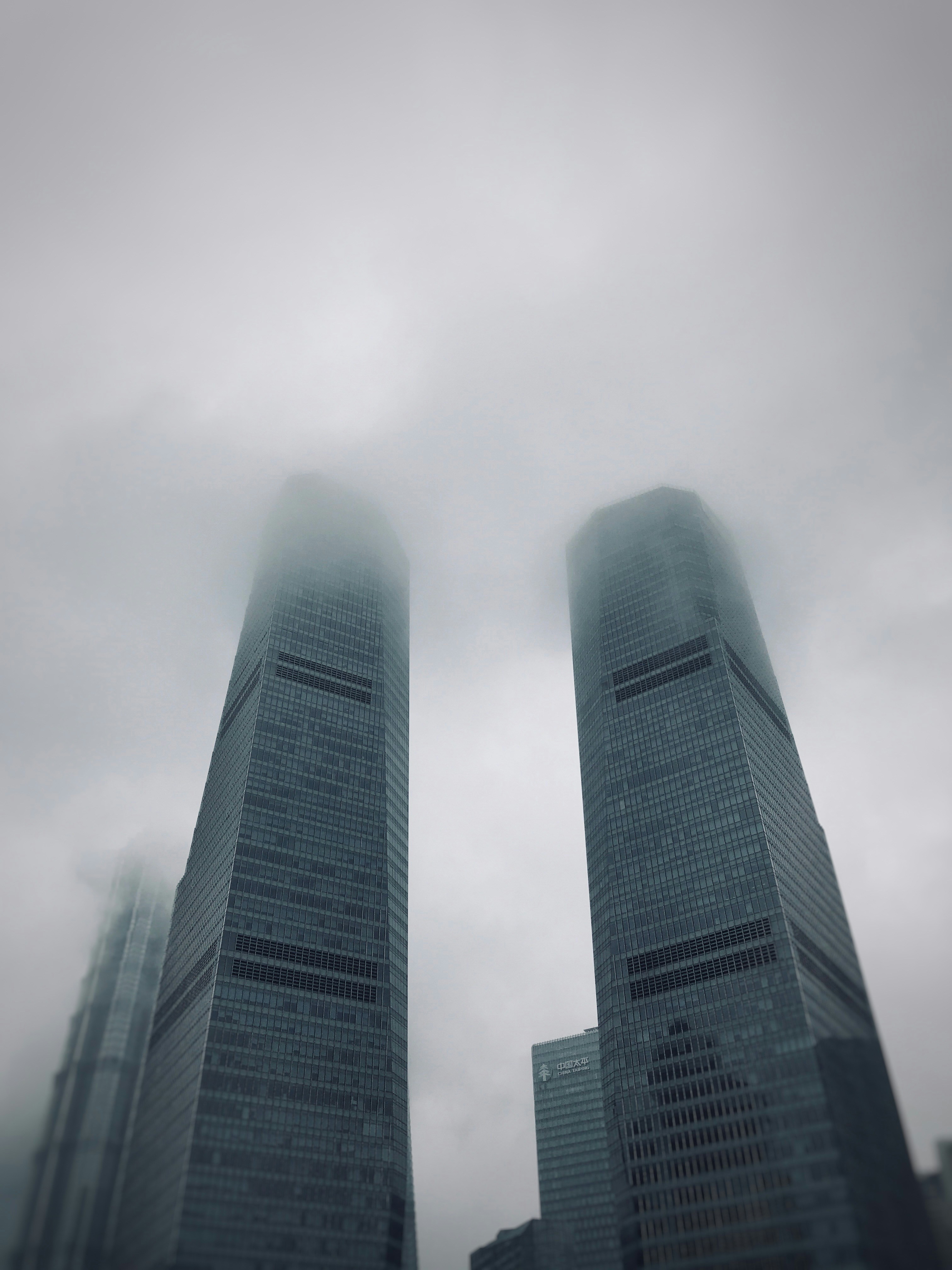 Gray high rise building under white clouds photo – Free Grey Image on ...