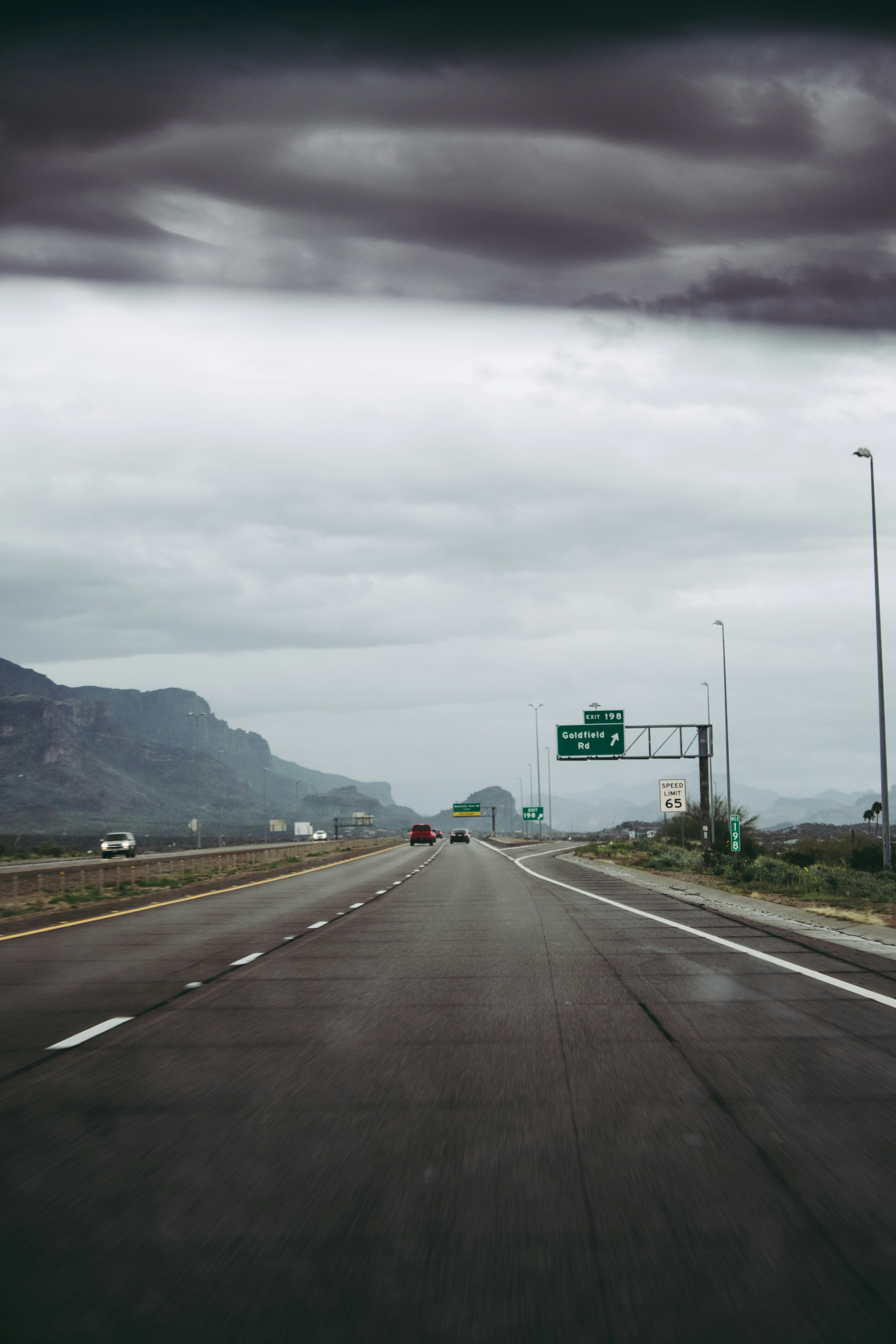 Green and white road sign photo – Free Grey Image on Unsplash