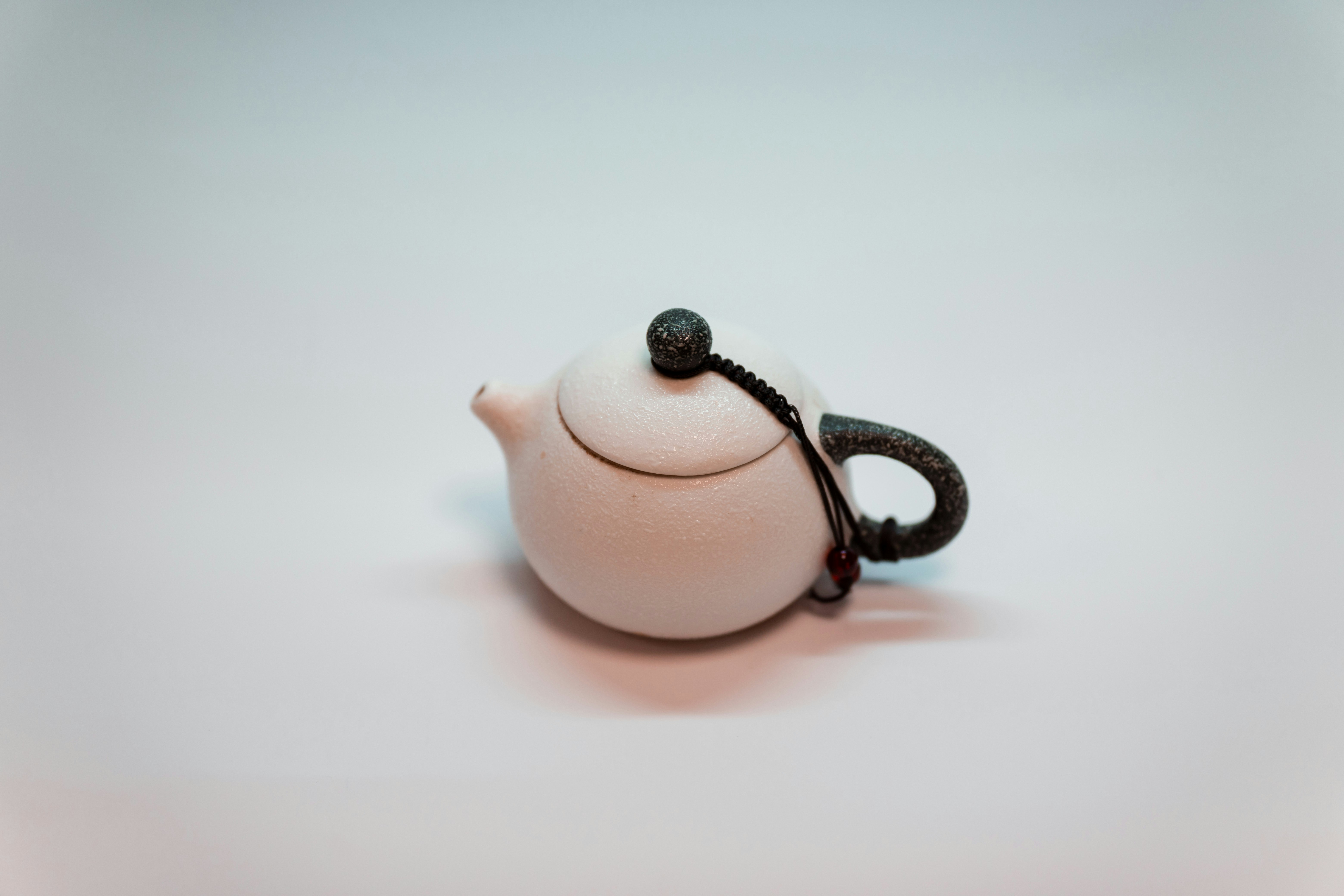 White ceramic teapot on white table photo – Free Brown Image on Unsplash