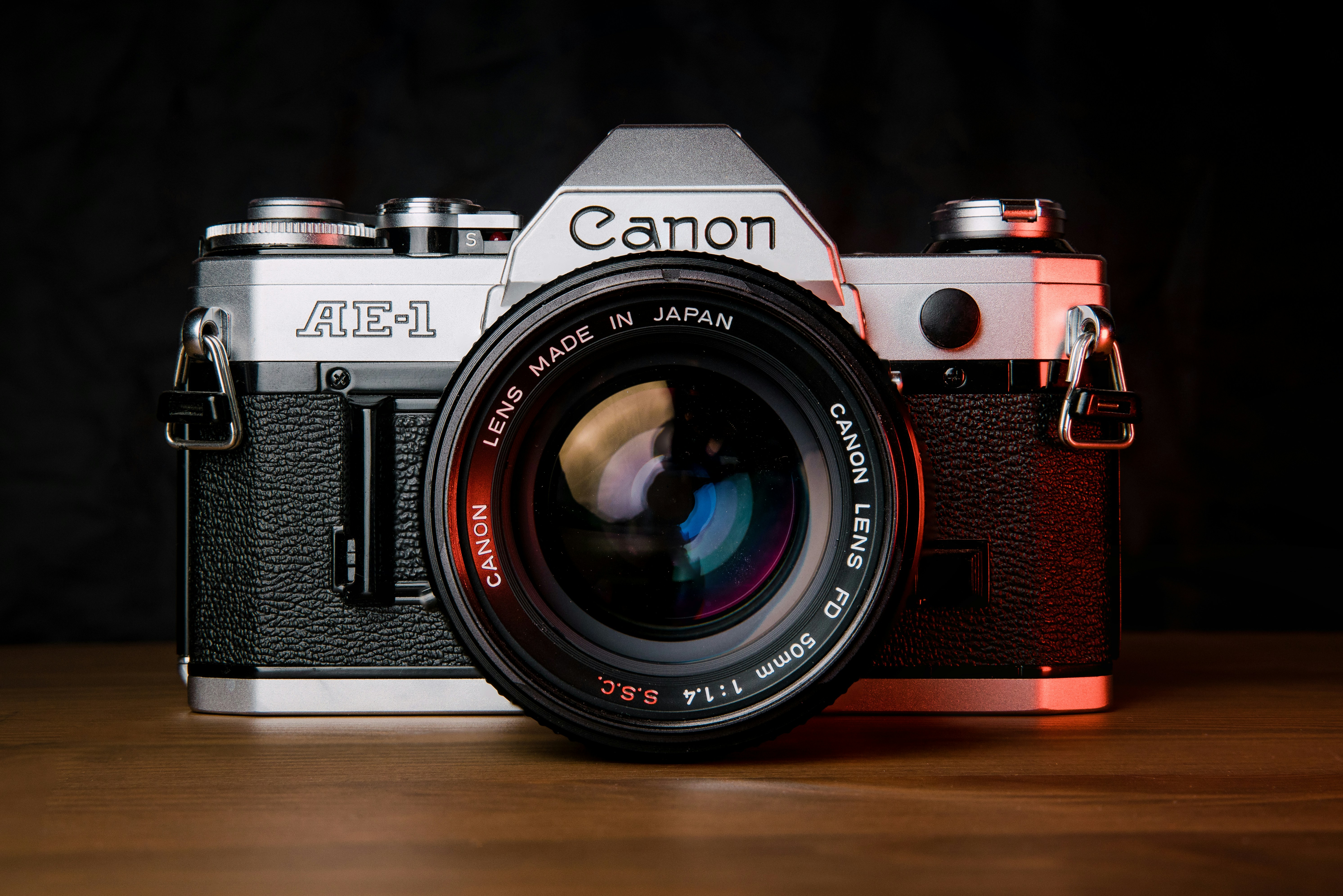 black and silver nikon dslr camera