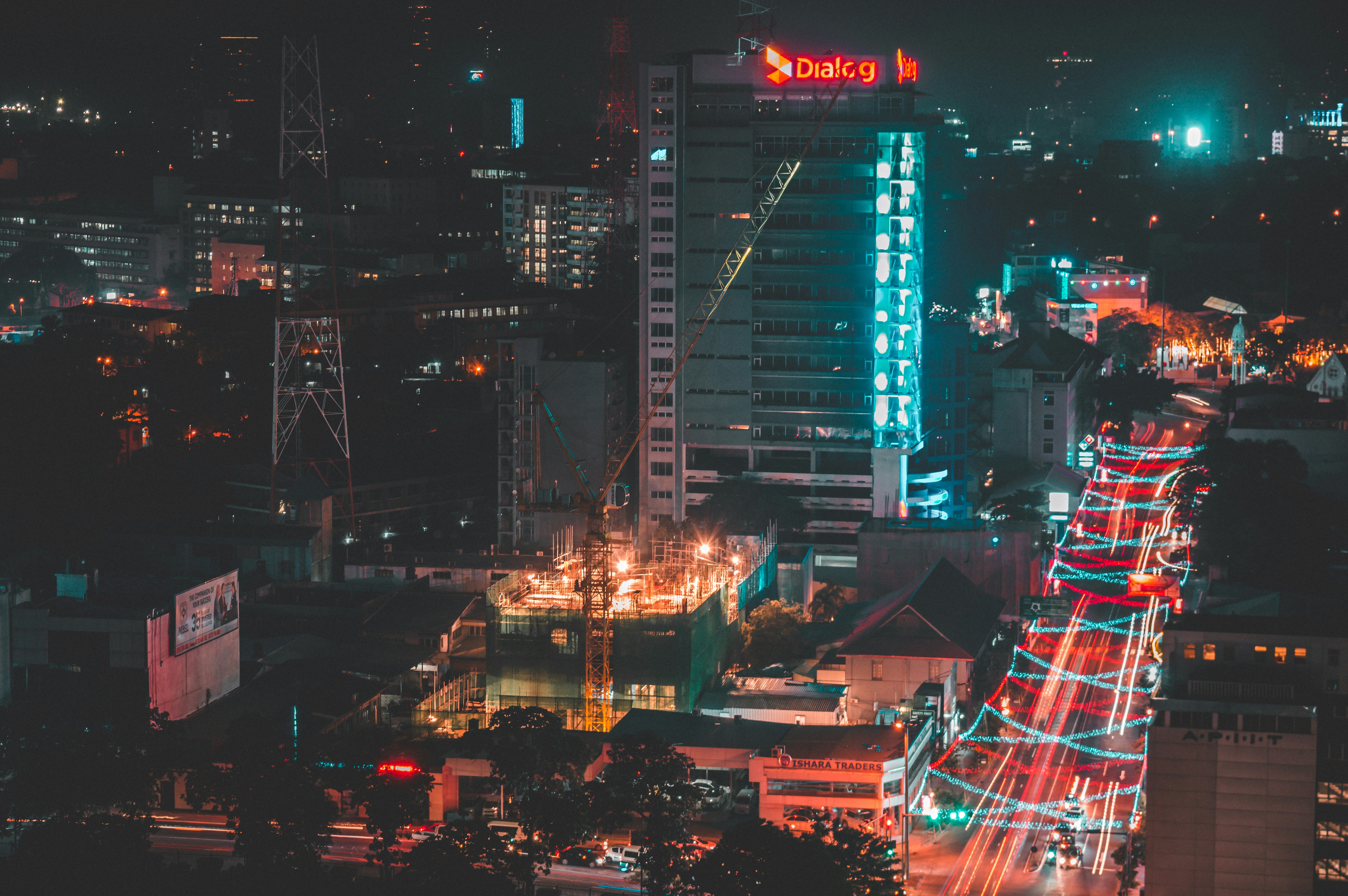 City with high rise buildings during night time photo – Free City Image ...