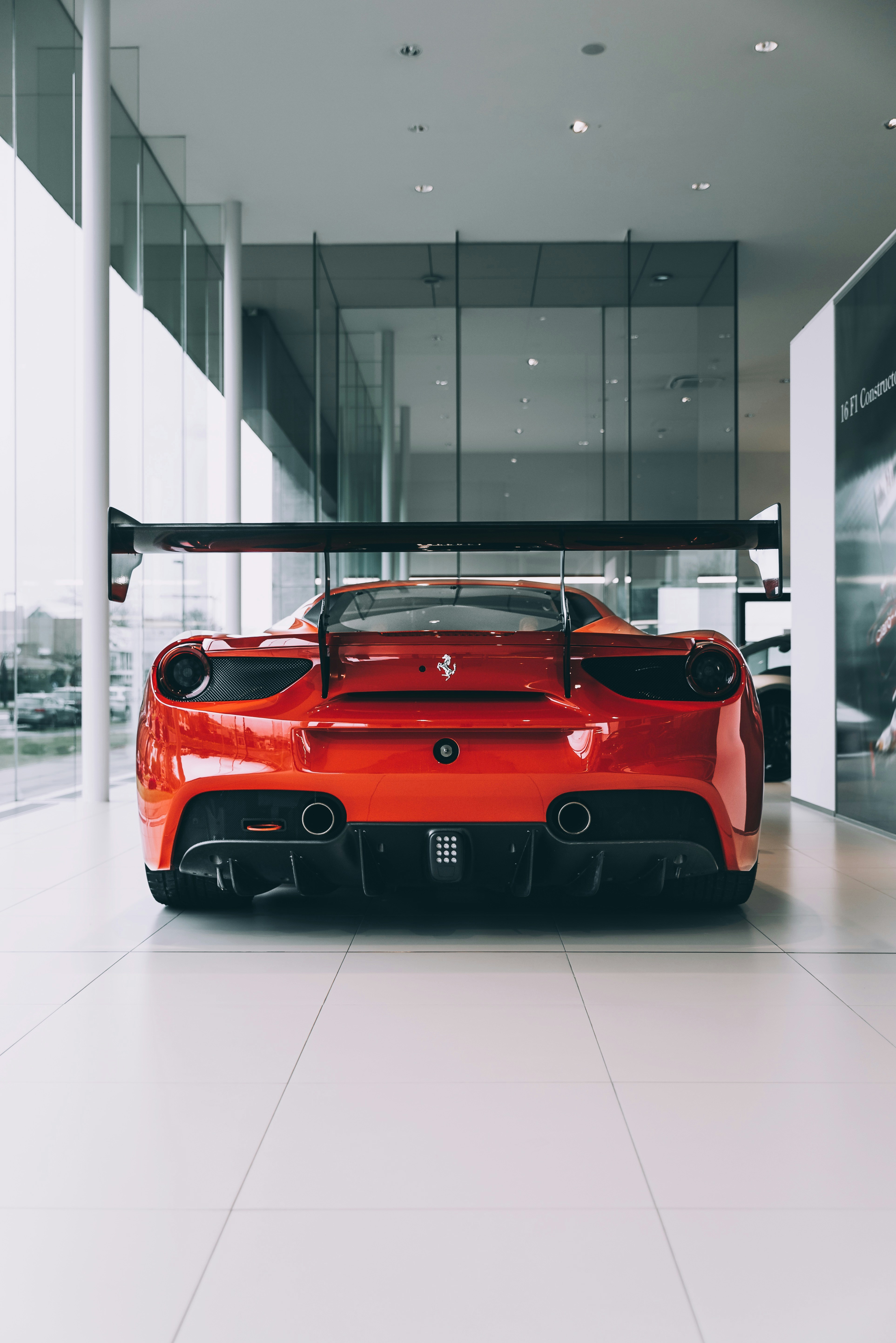 Red ferrari 458 italia parked inside building photo – Free Car Image on ...