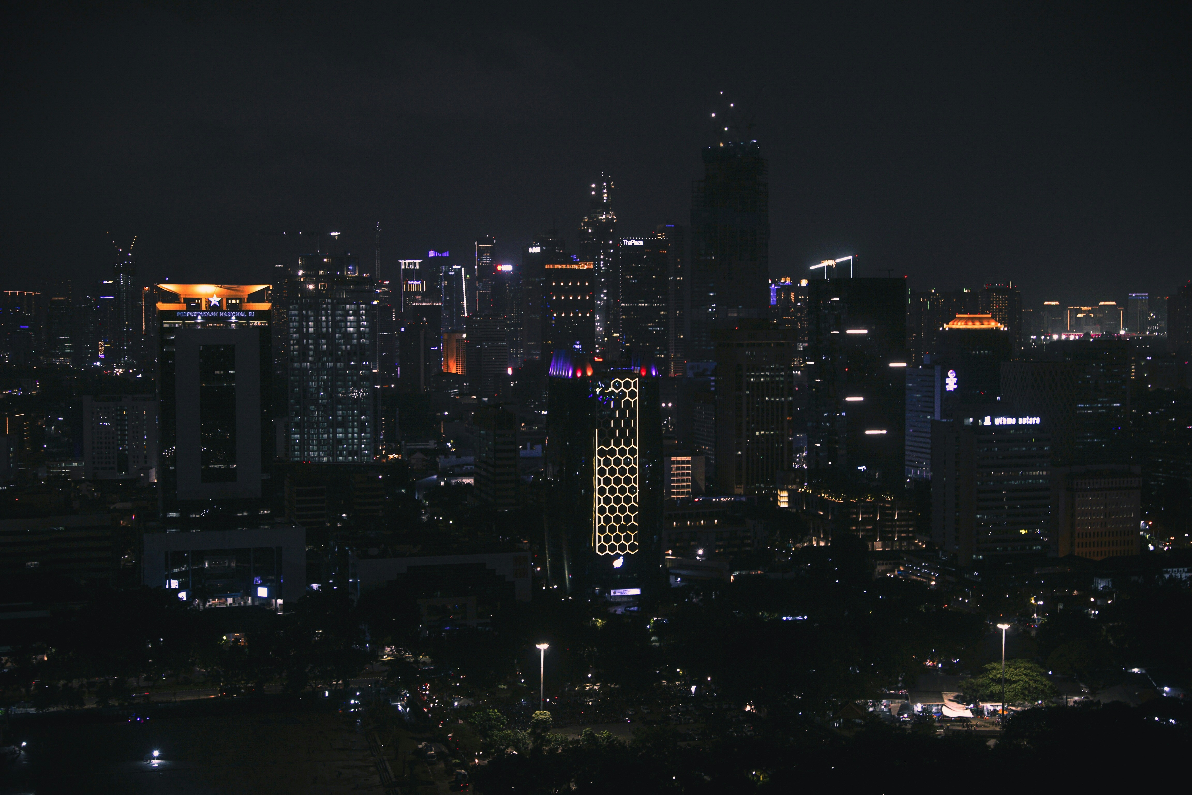 City with high rise buildings during night time photo – Free Jakarta ...