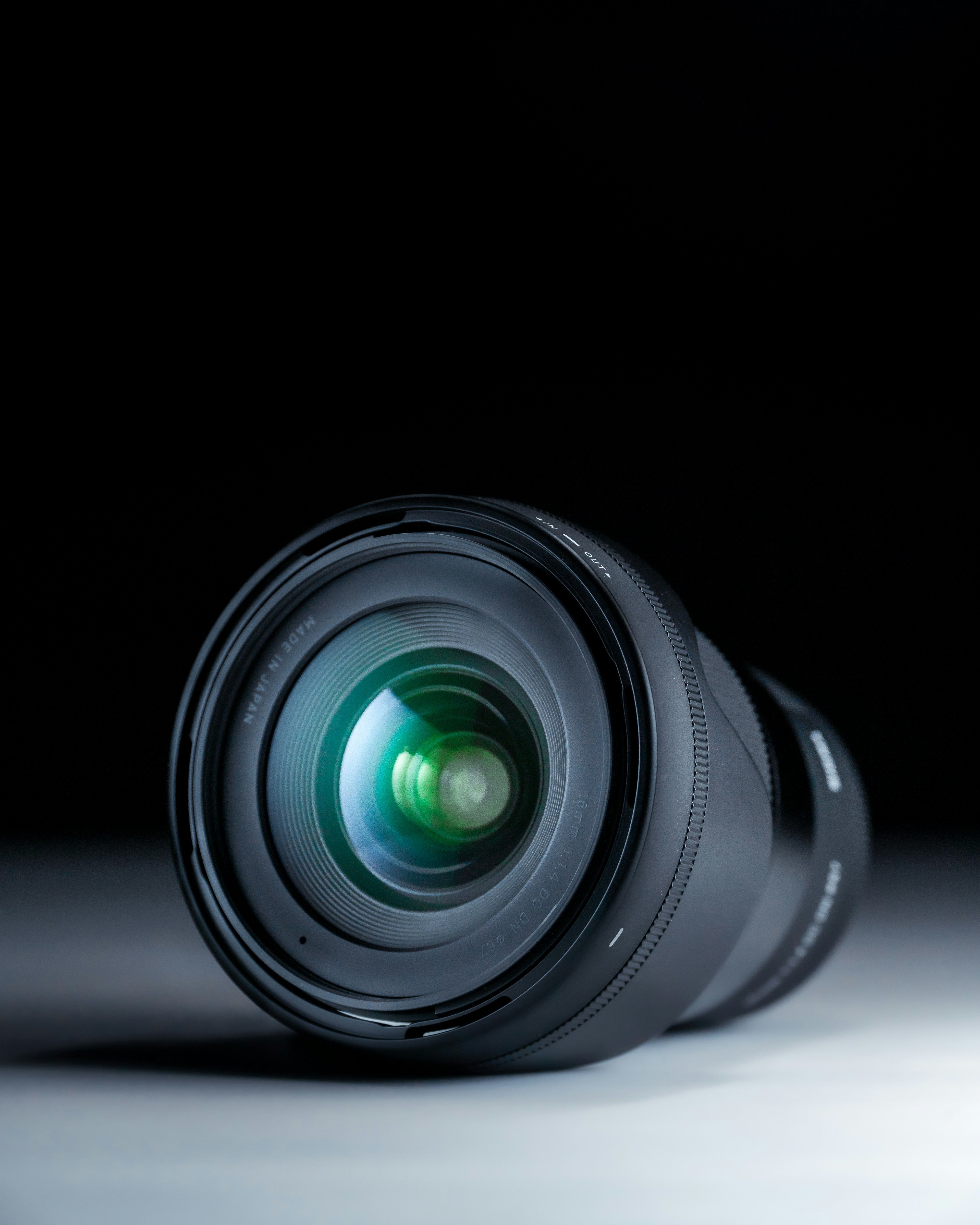 Black camera lens on black surface photo – Free Poland Image on Unsplash