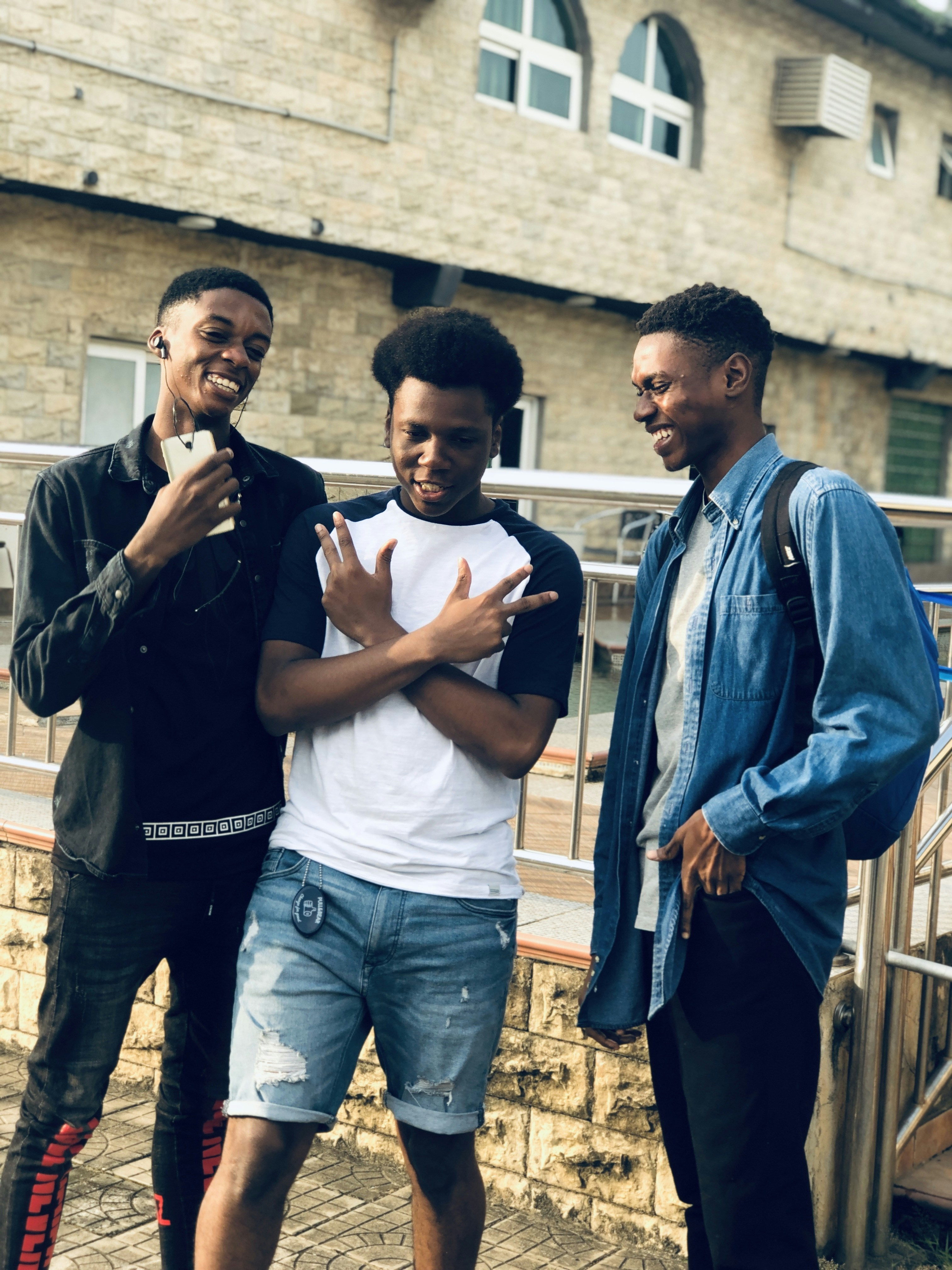 Friends in a Casual Circle: Laughter and Camaraderie by the Brick Campus