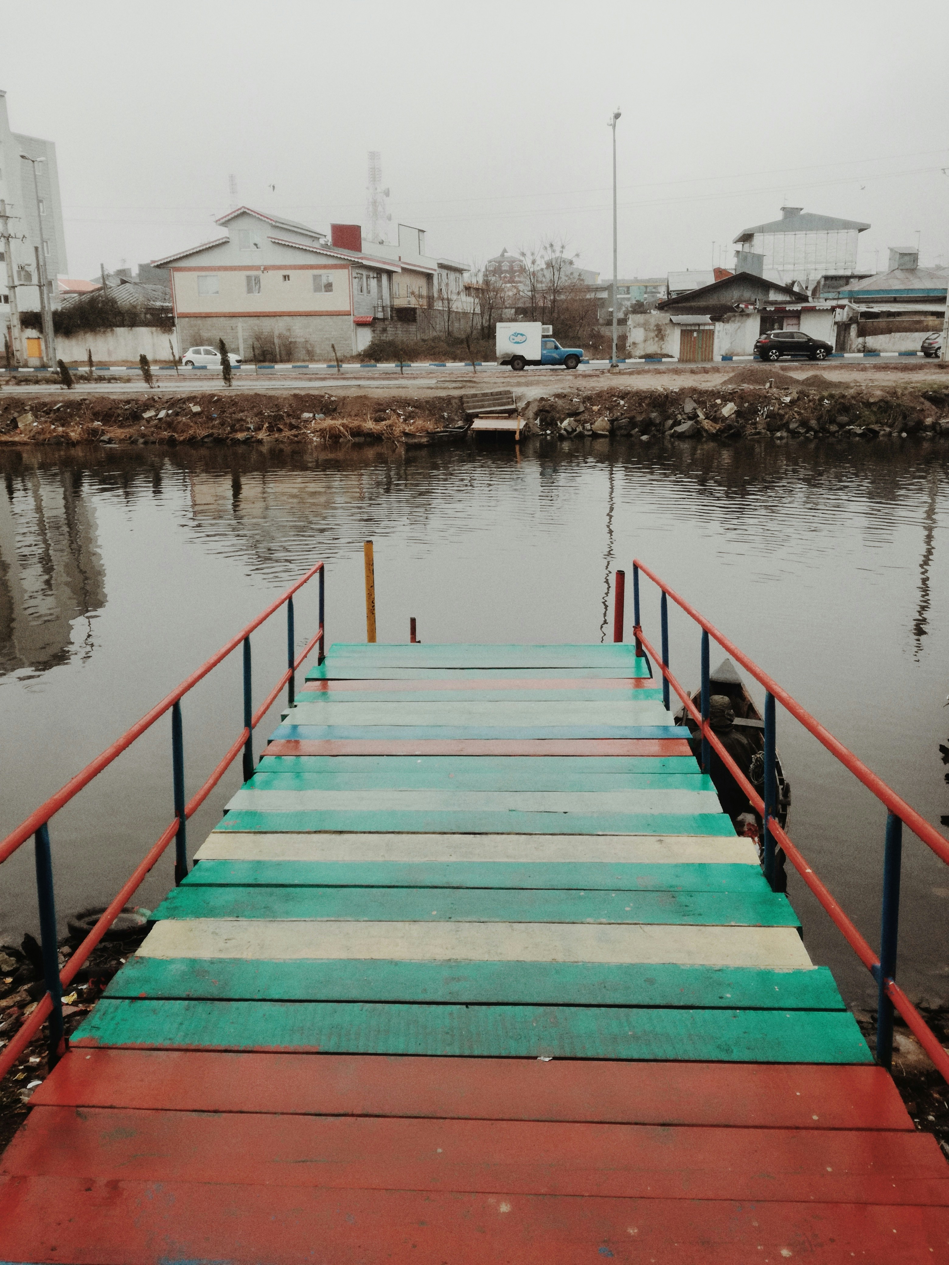 Green and red wooden dock photo – Free Iran Image on Unsplash