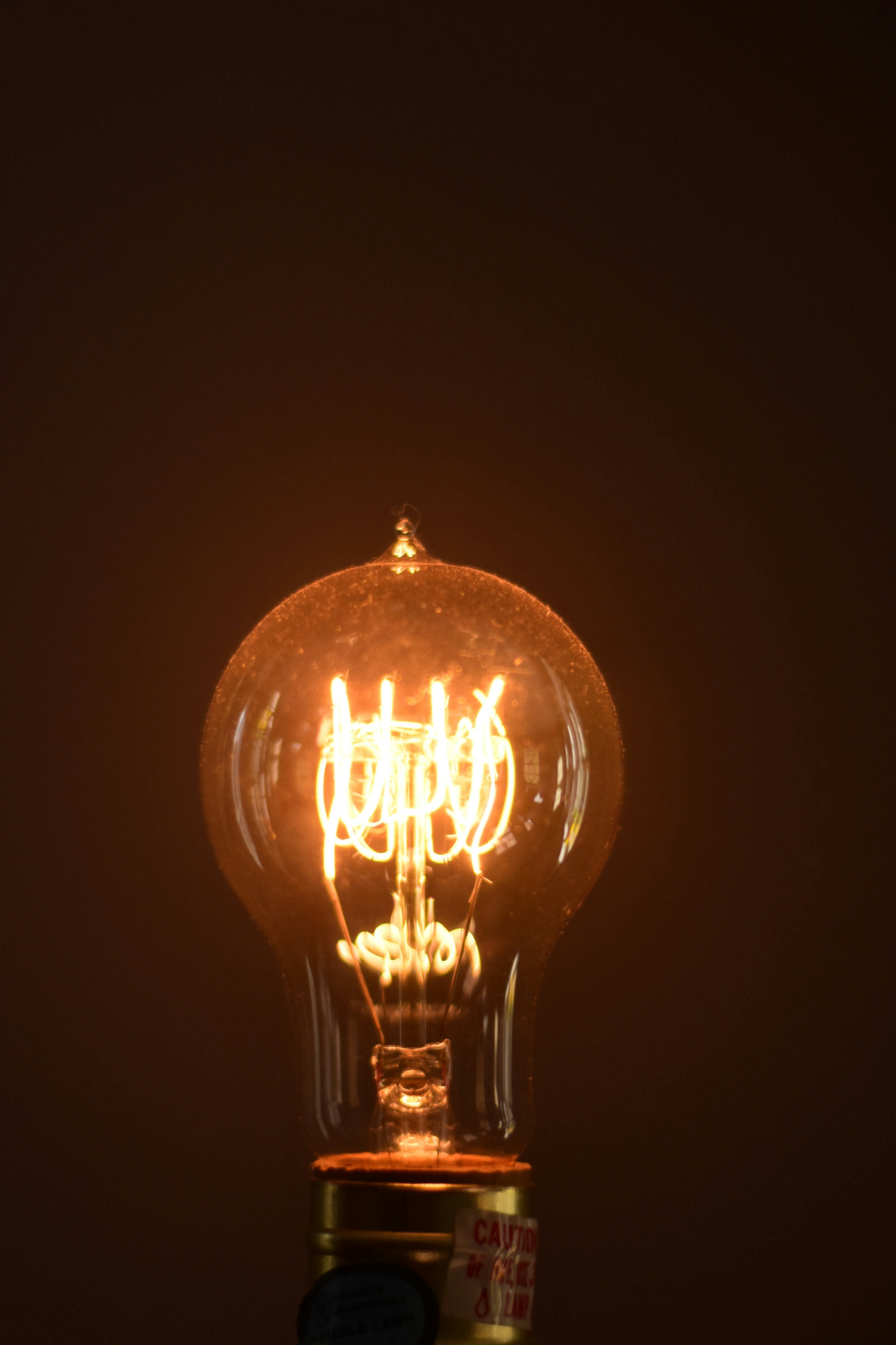 Brown and black lamp turned on during night time photo – Free Brown ...