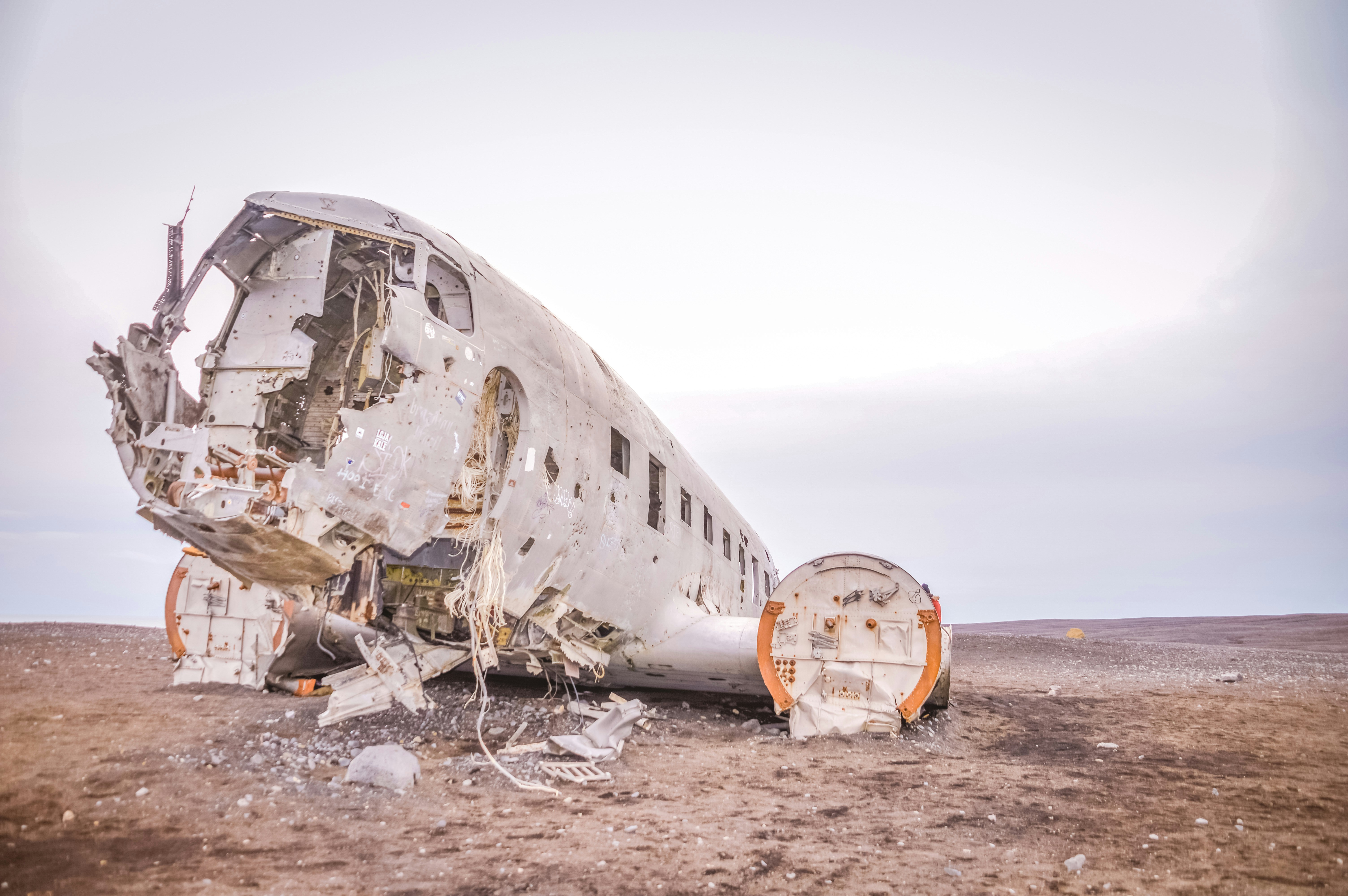 Wrecked airplane on brown sand during daytime photo – Free ...