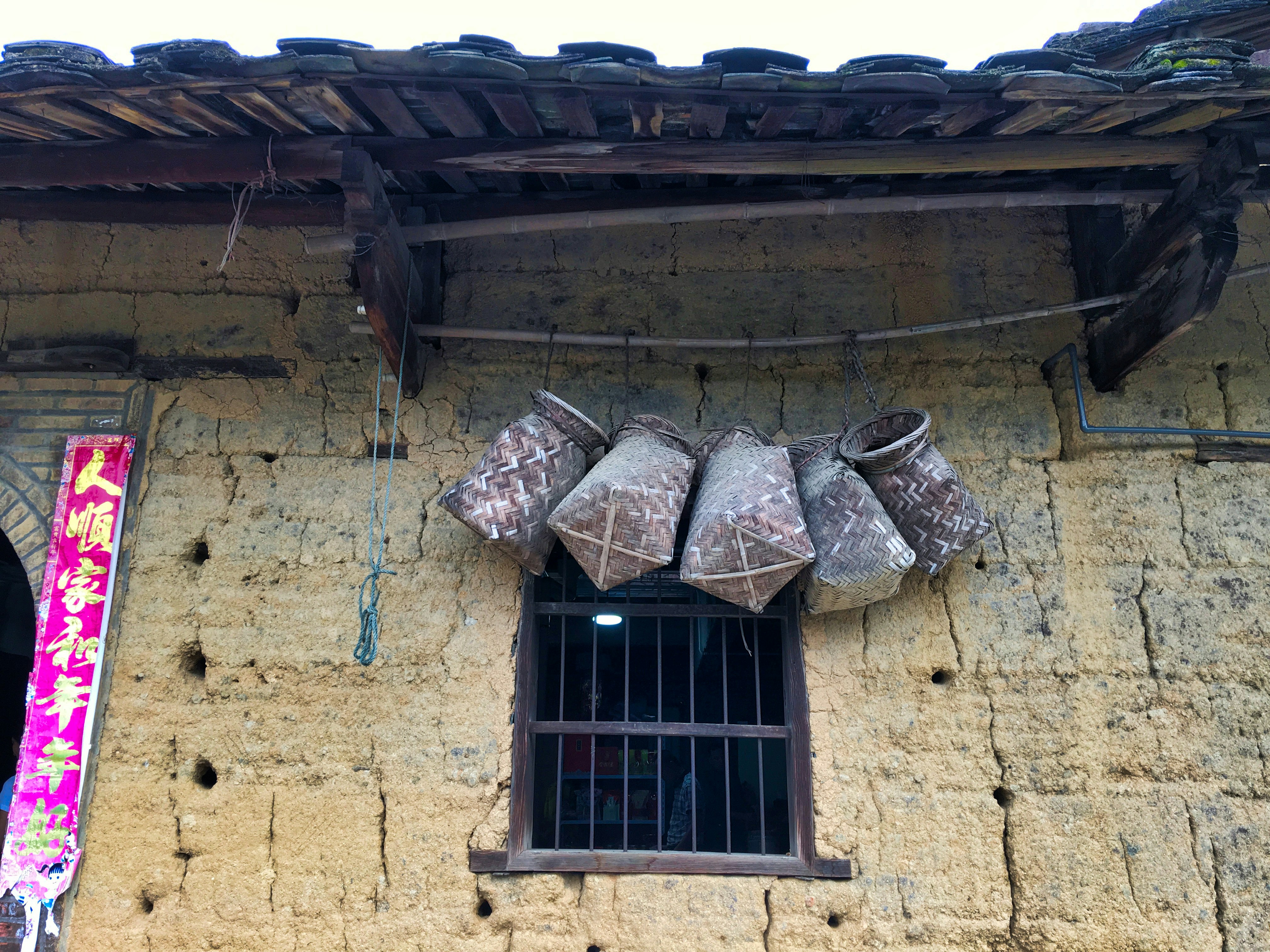Woven Baskets Crown a Mudbrick Window