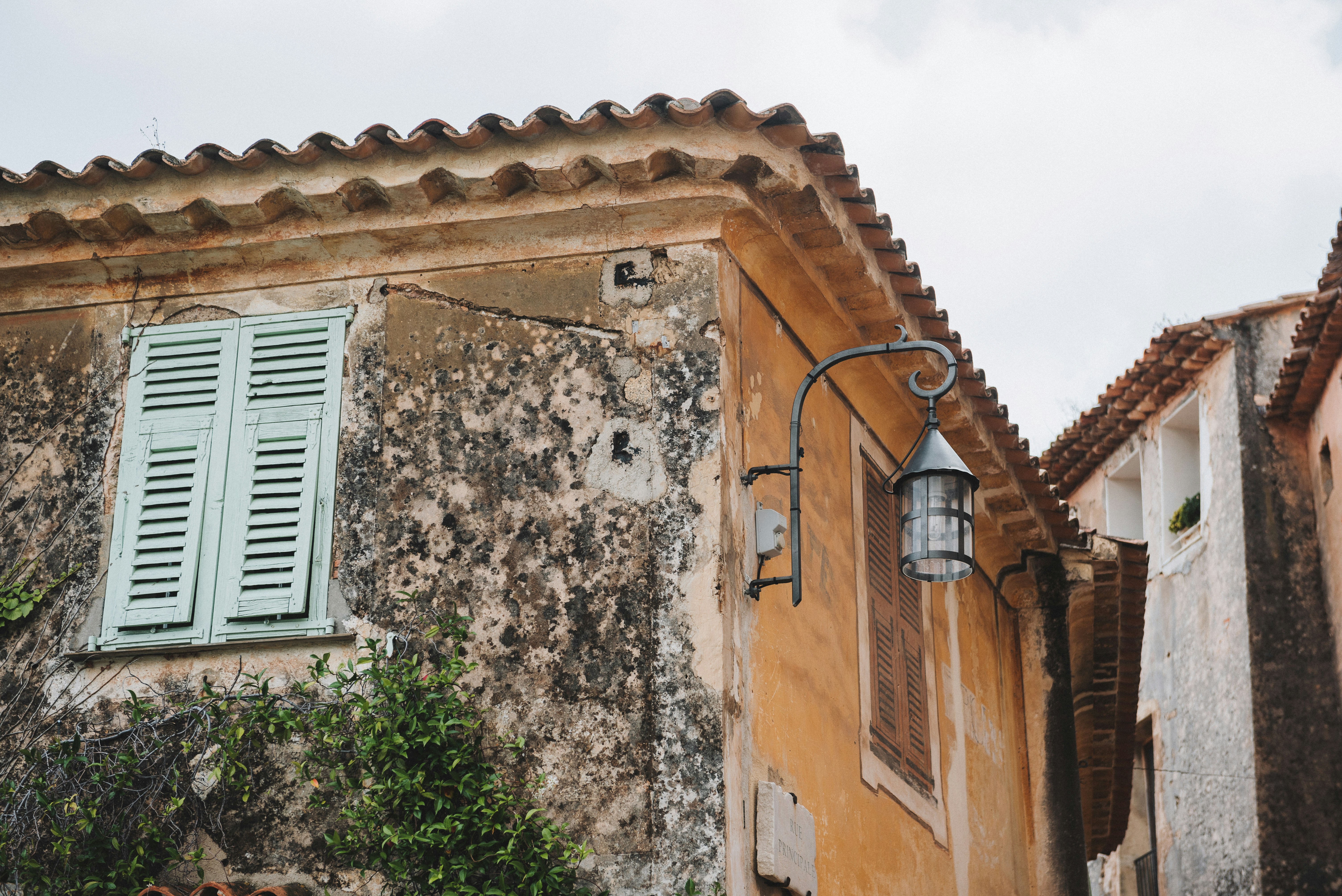 Brown brick walled building under white sky during daytime photo – Free ...