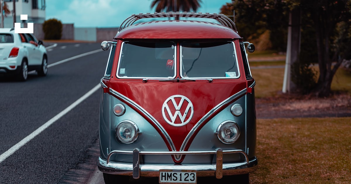 Red And White Volkswagen T 1 On Road During Daytime Photo Free Brown Image On Unsplash