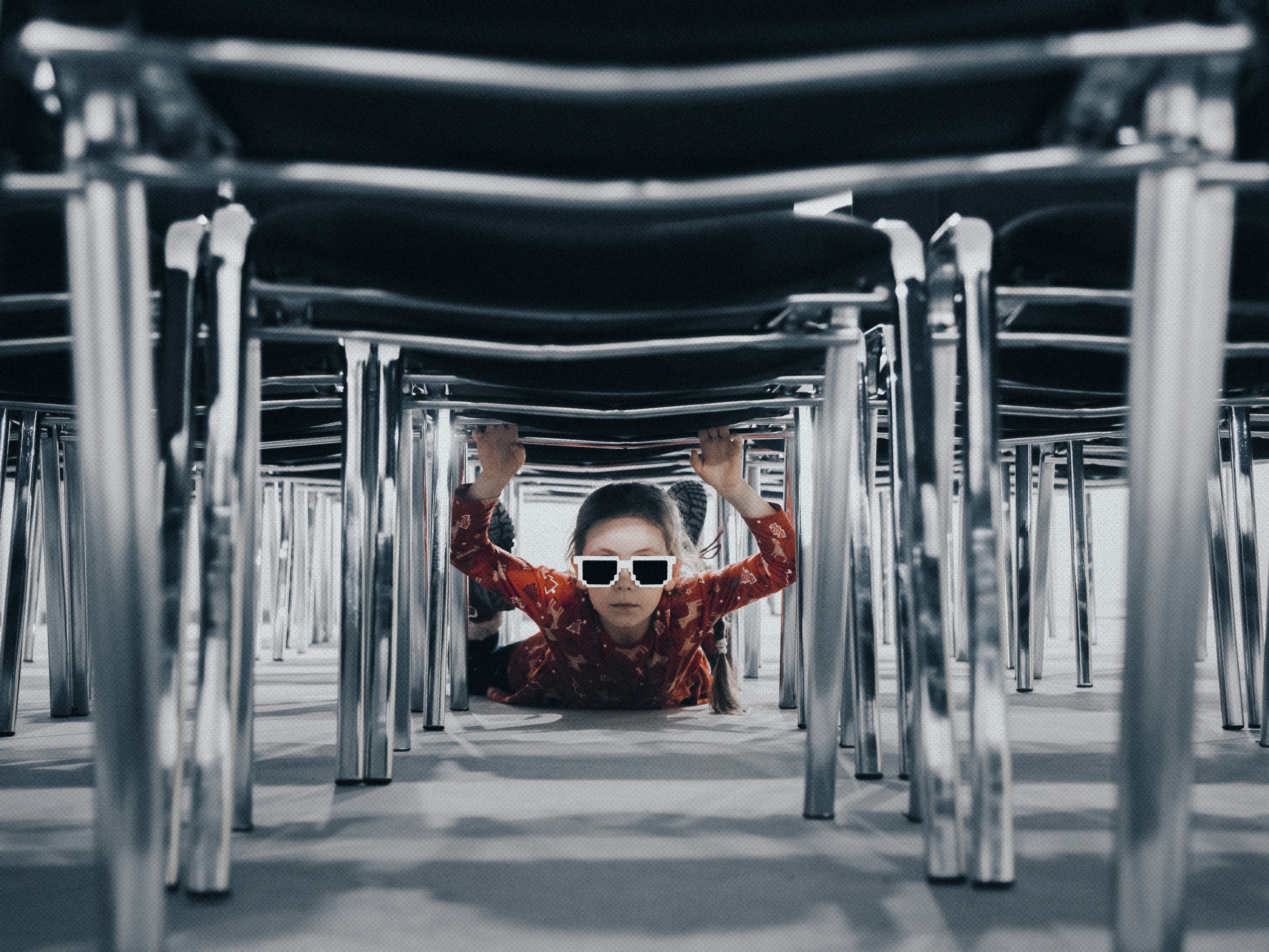 Under Chrome Arches: A Ground-Level Portrait of Playful Defiance