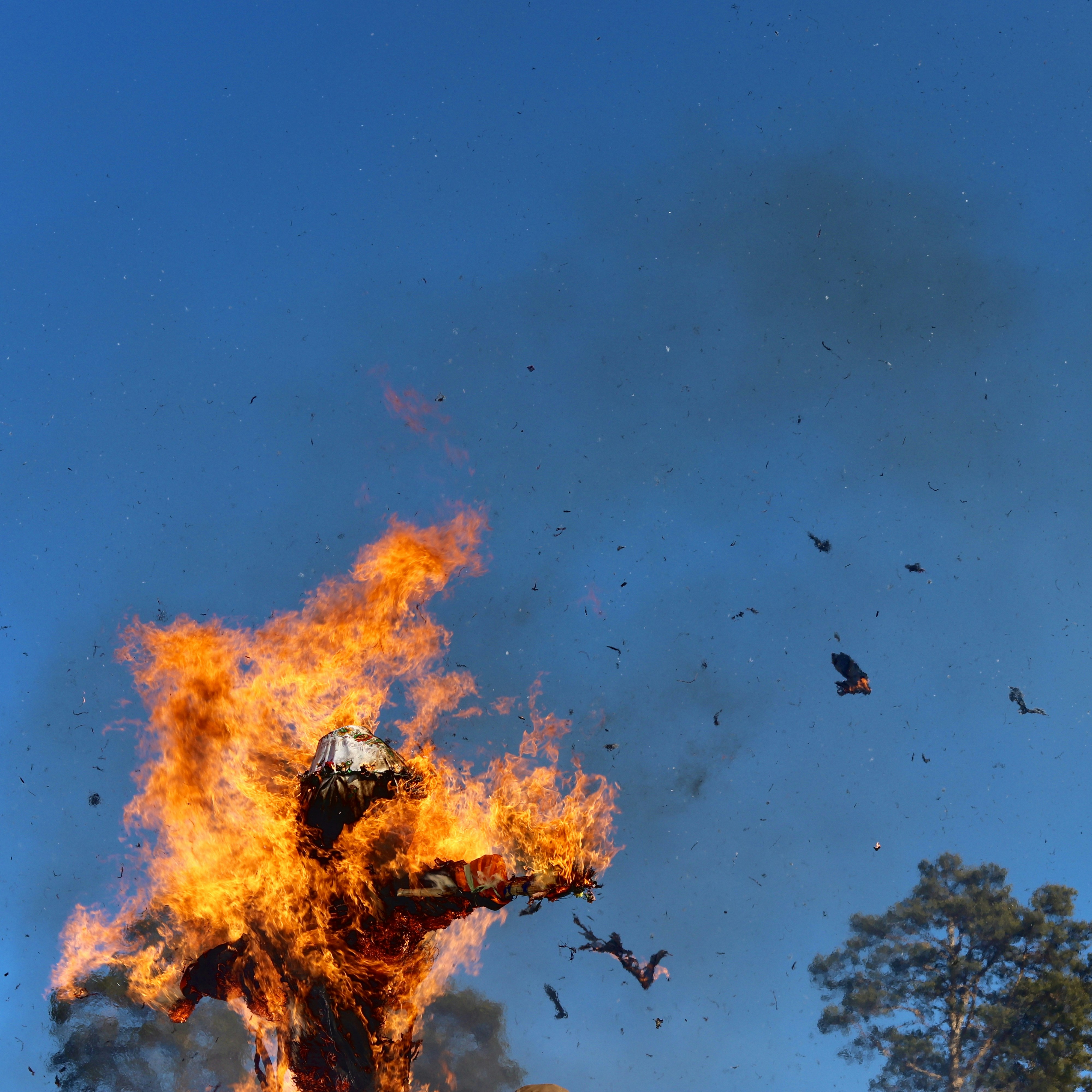Towering Bonfire Under a Cobalt Sky