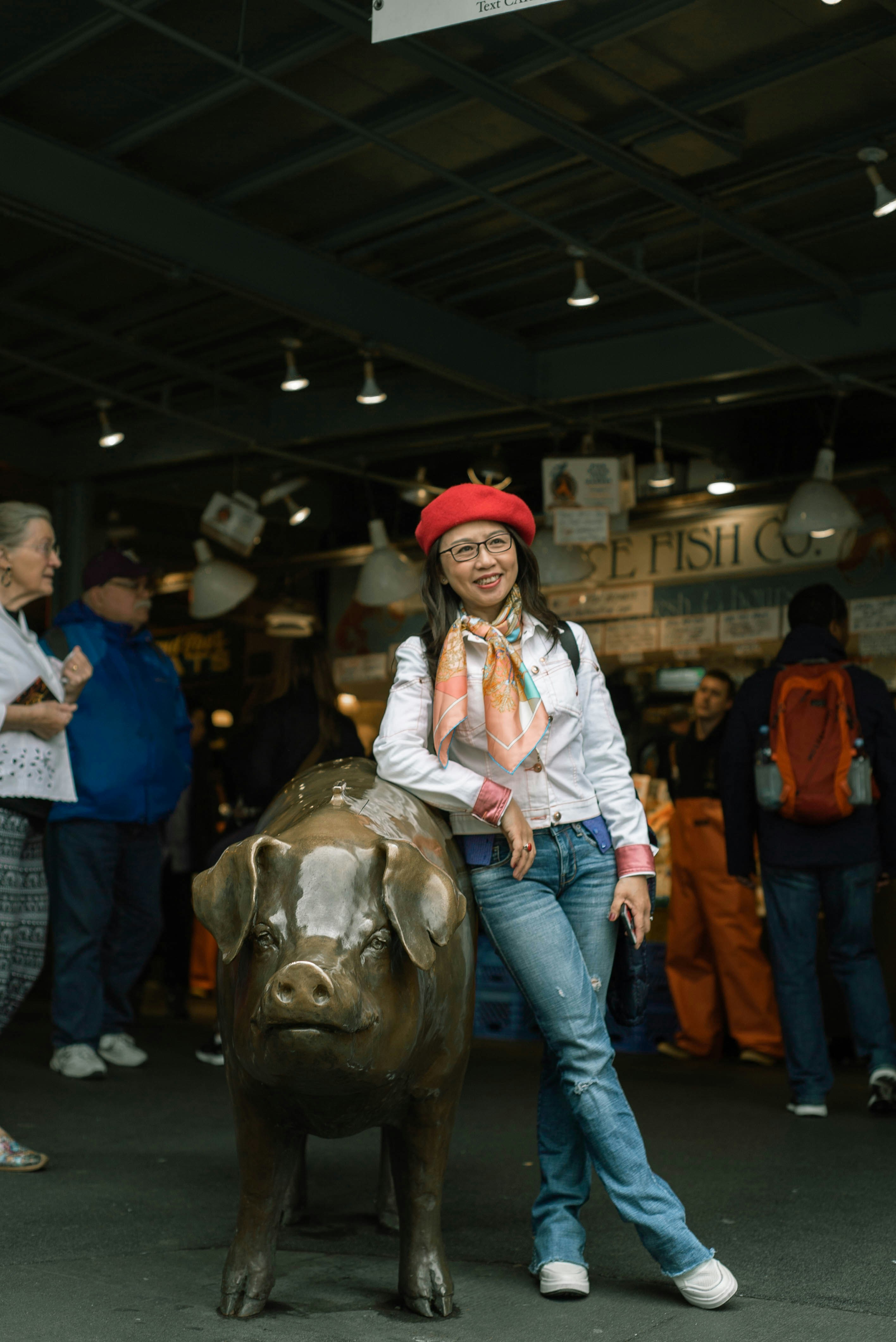 Red Beret, Bronze Pig: A Portrait at the Indoor Market