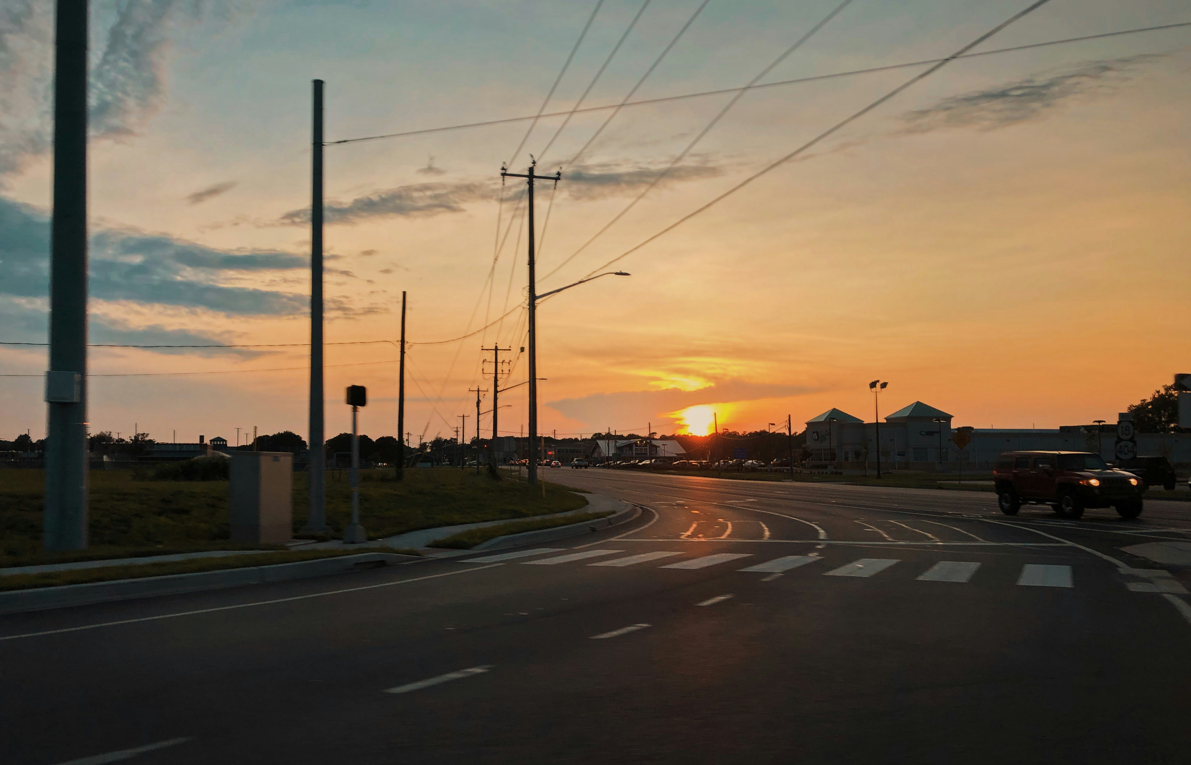 Gray concrete road during sunset photo – Free Road Image on Unsplash