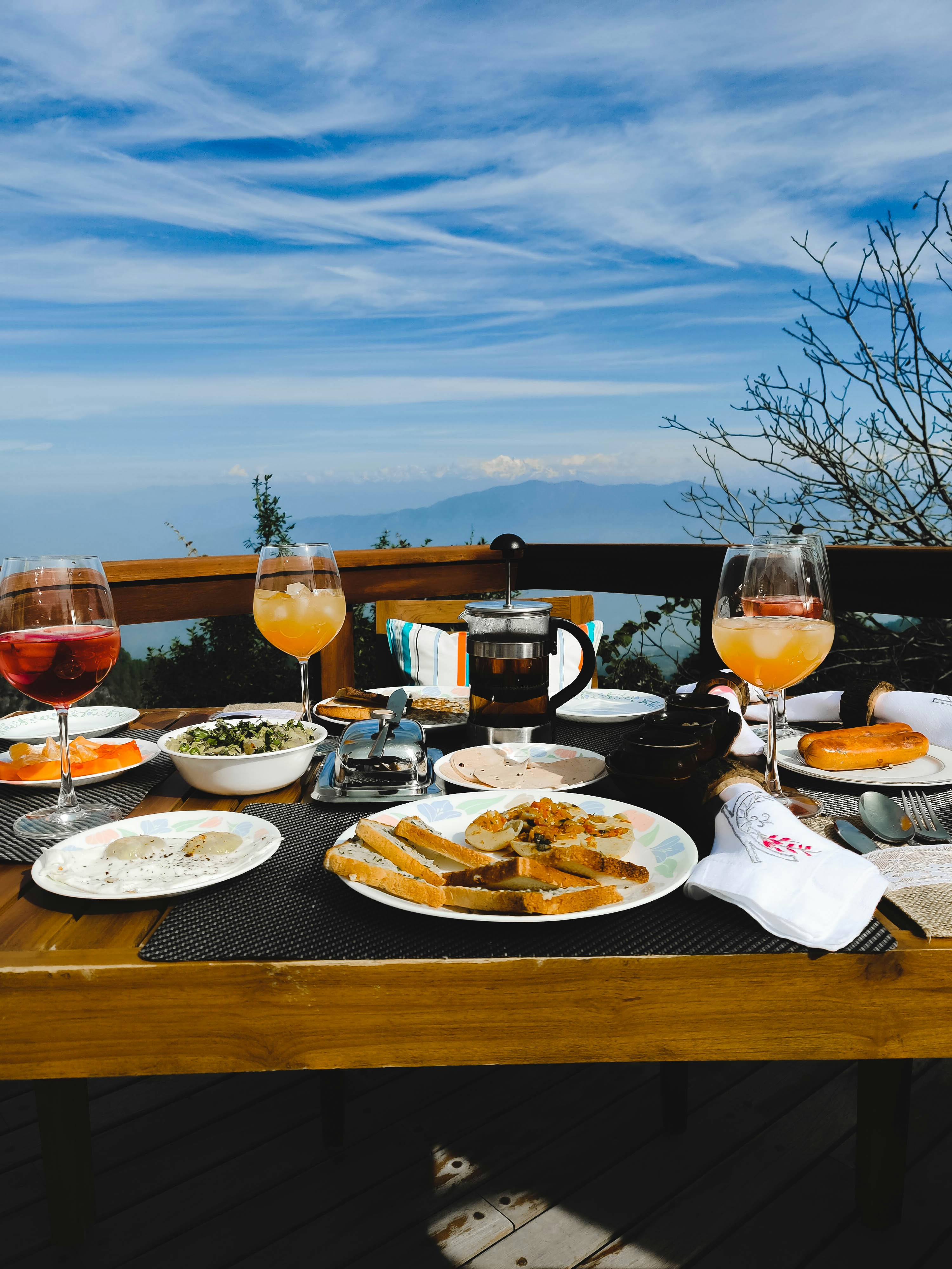 Alpine Brunch on a Balcony: Toasts, Juices, and a Mountain View