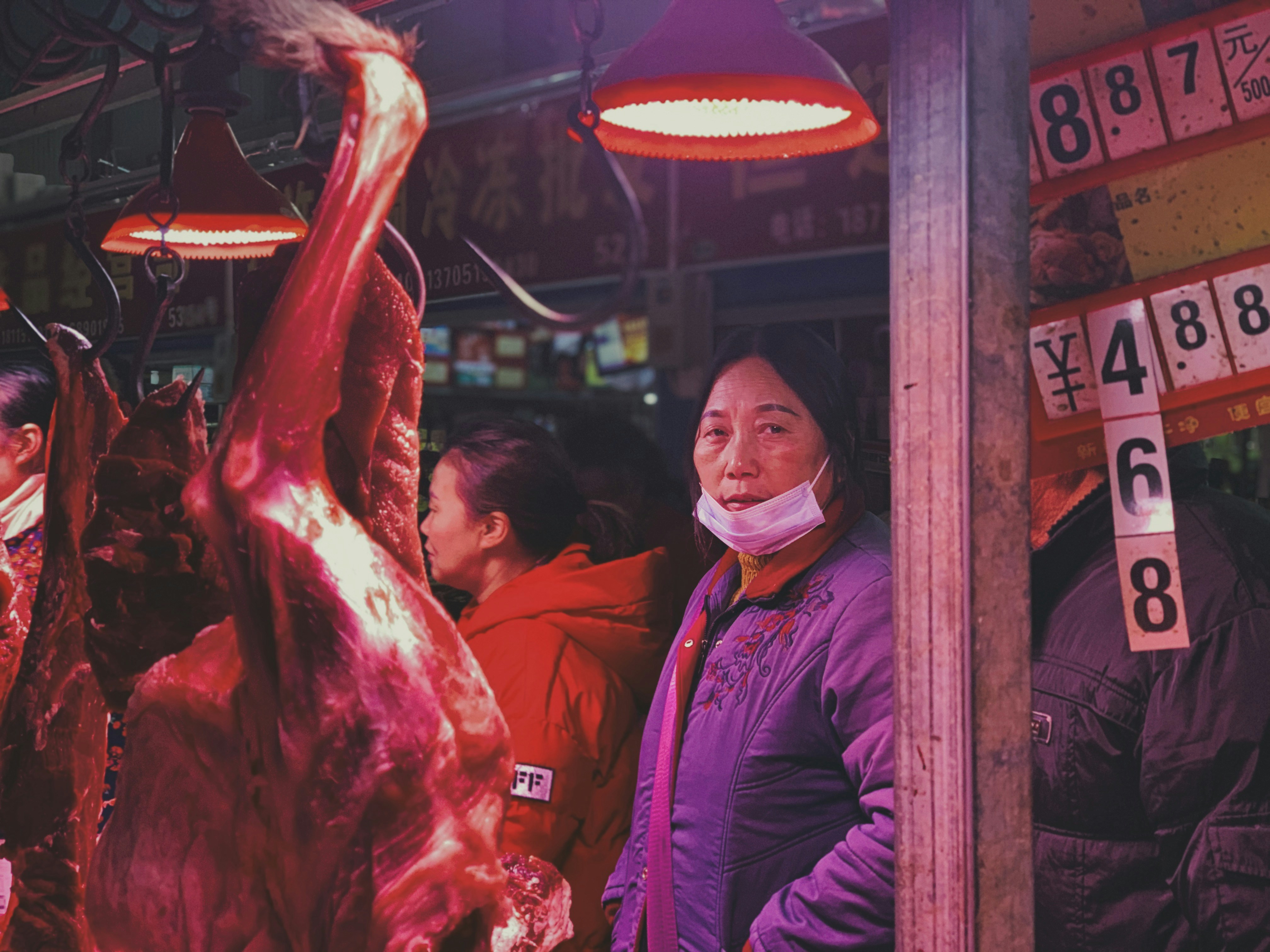Man in red jacket holding raw meat photo – Free Human Image on Unsplash