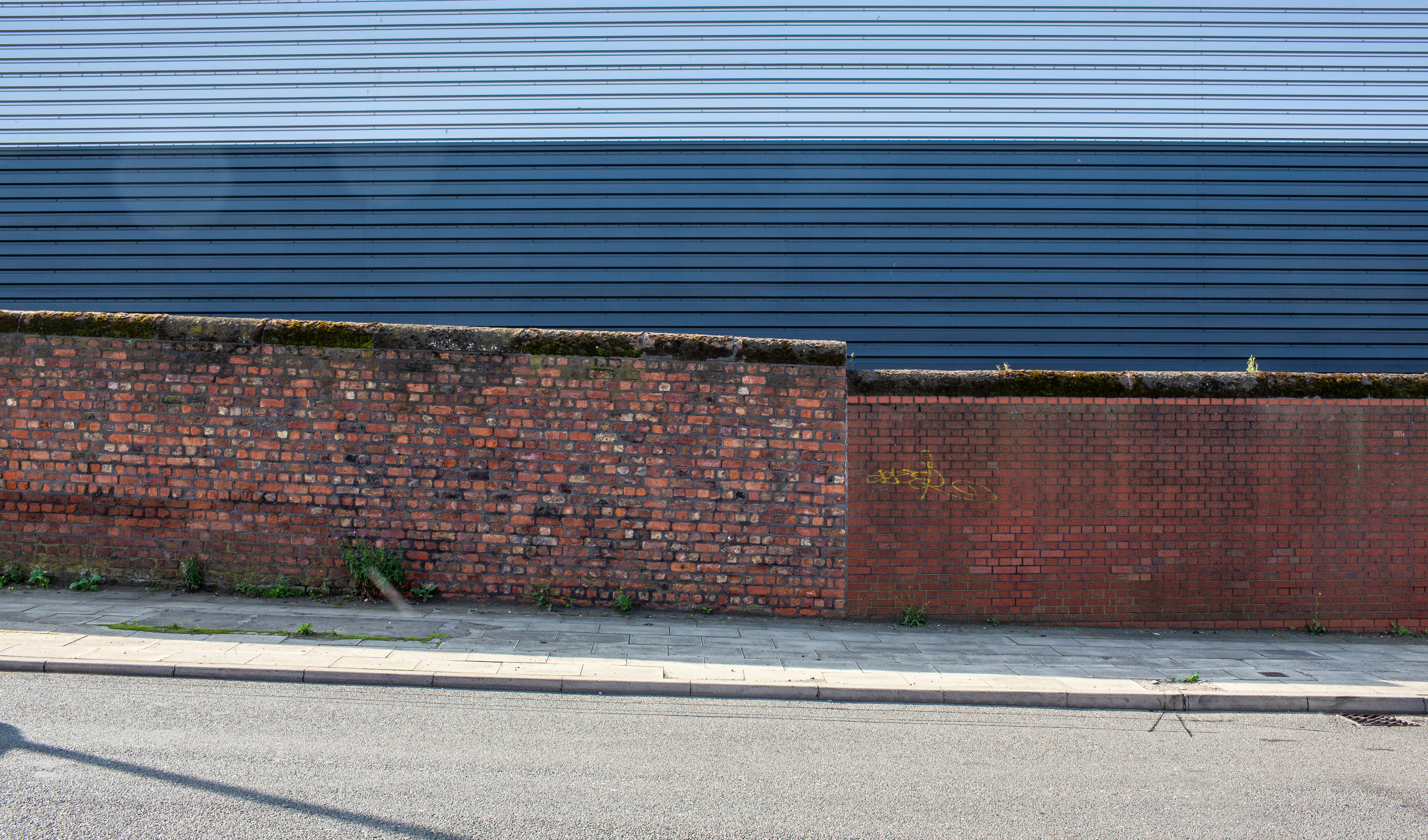 Brick and Metal Line: A Quiet Industrial Pace