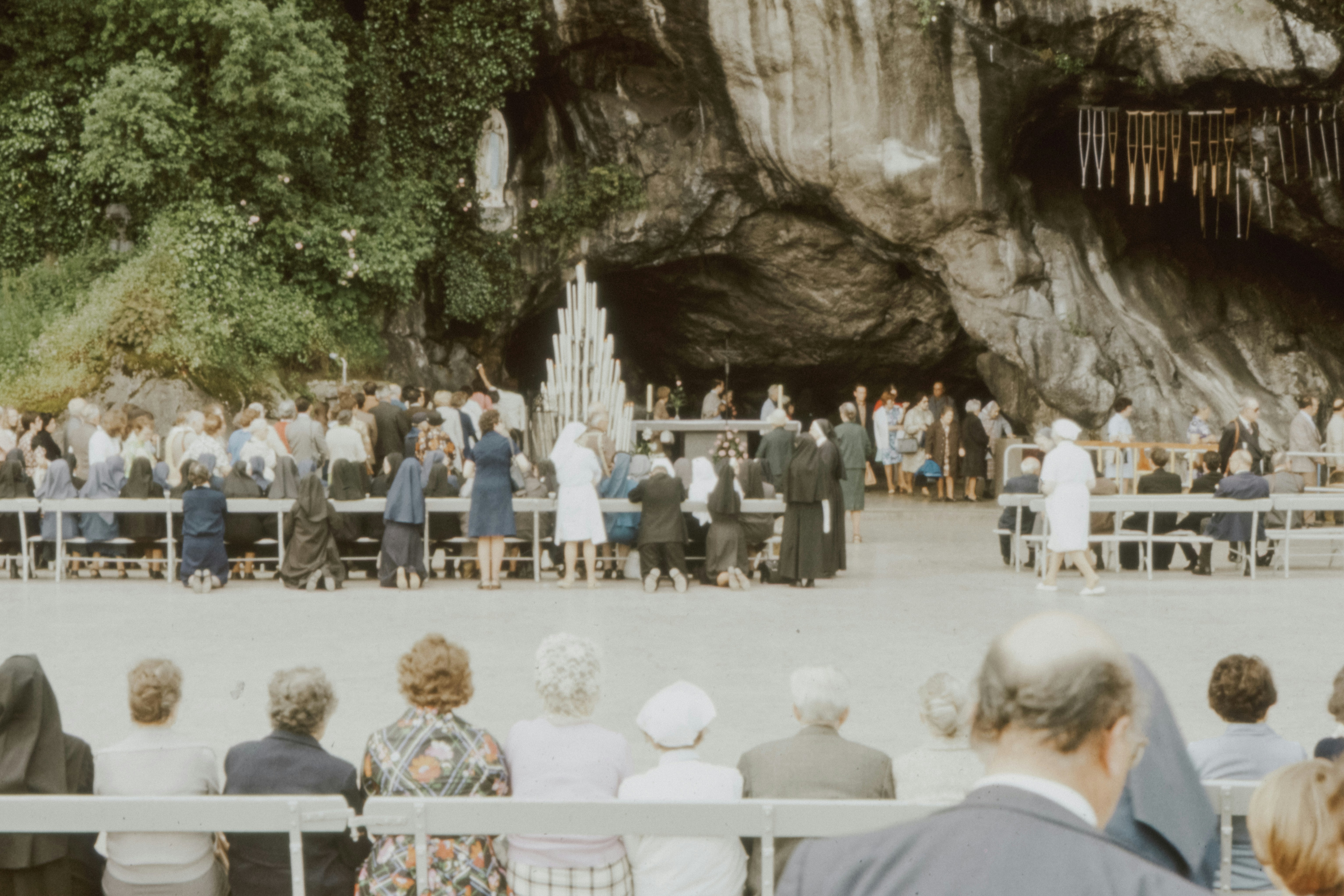 Rite Beneath the Cavern Gate: Congregants Gather at the Stone-Altar