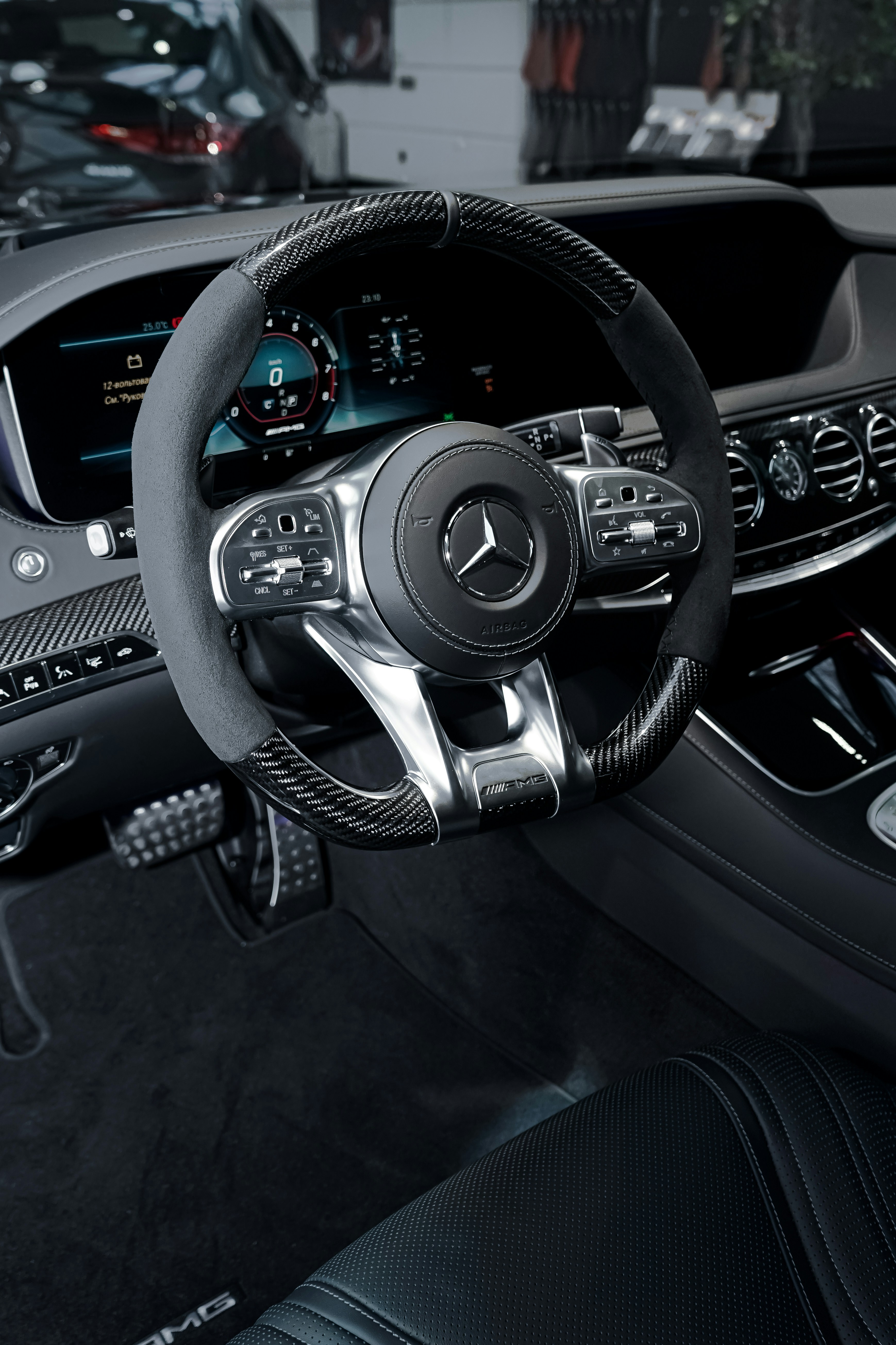 Mercedes-Benz AMG 63 S
Each–catching. From any perspective  | black and gray car steering wheel