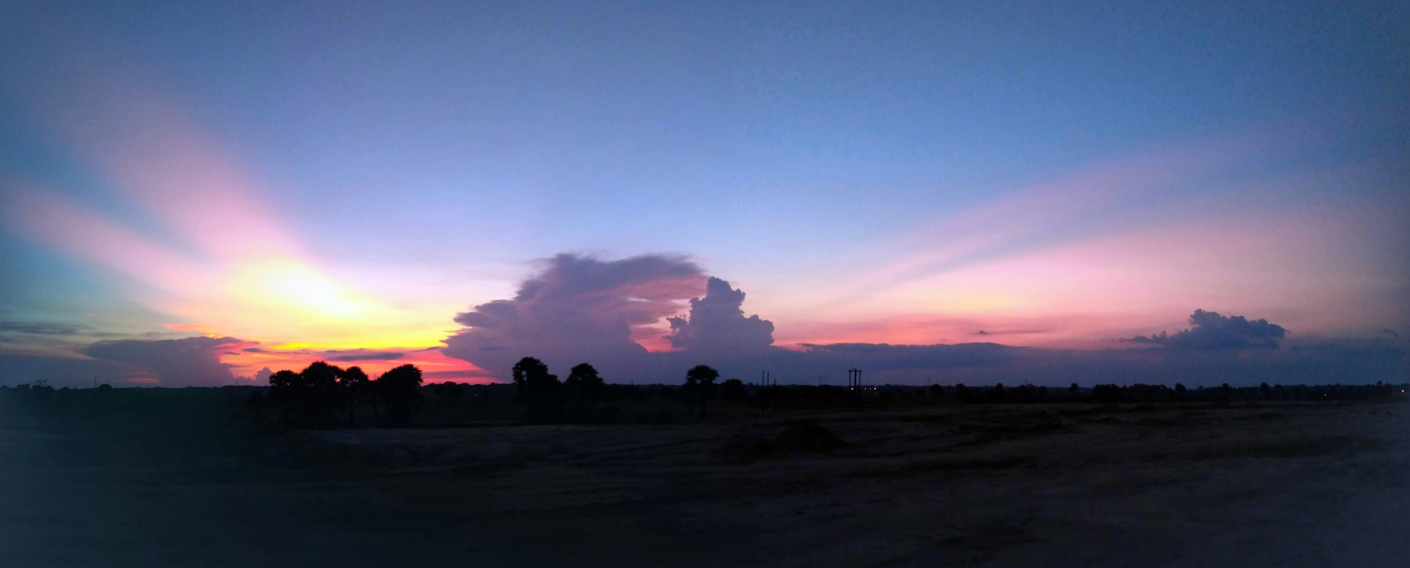 Cloud Crown at Dusk Over a Desert Horizon
