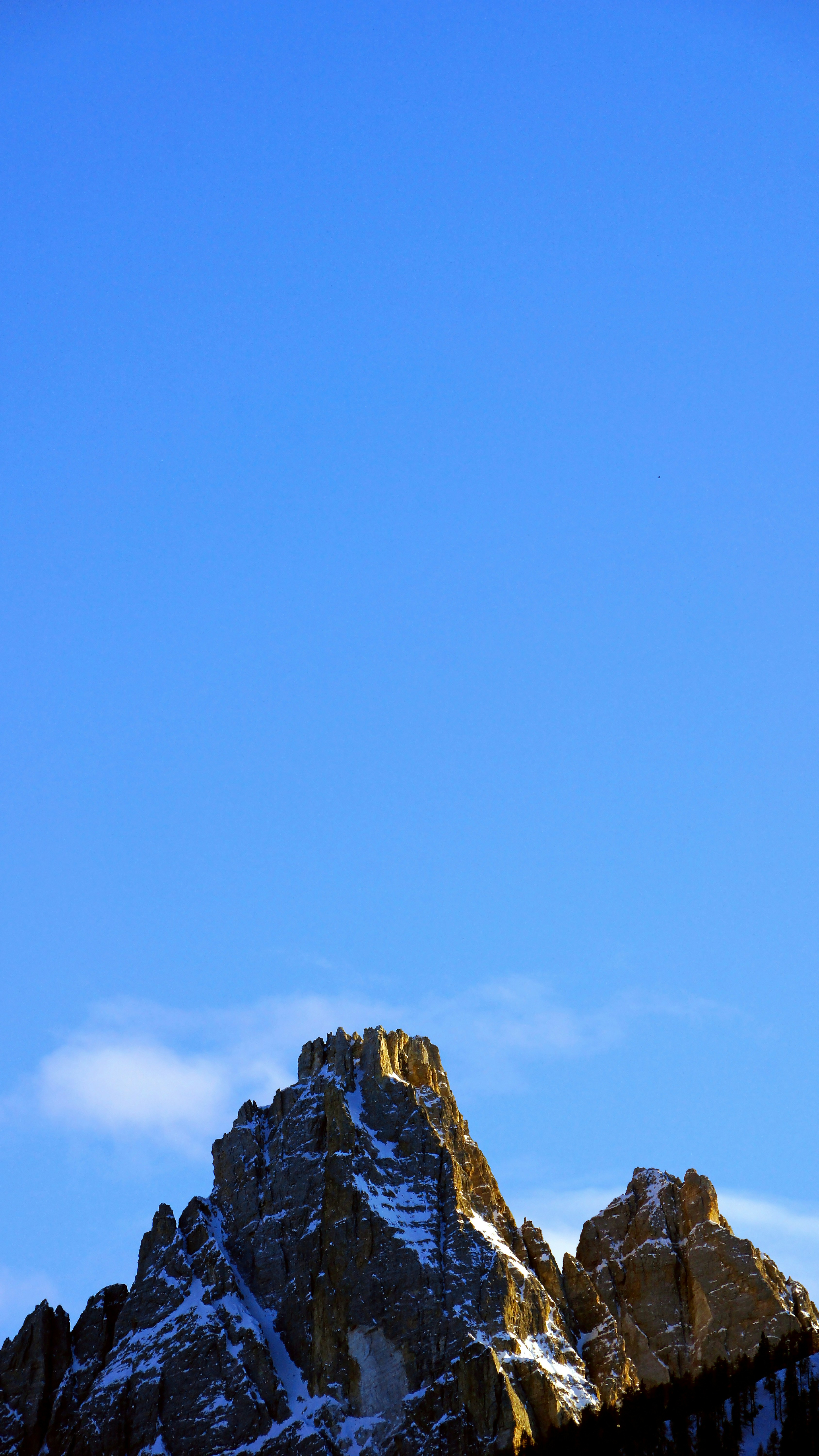 brown rock formation under blue sky during daytime