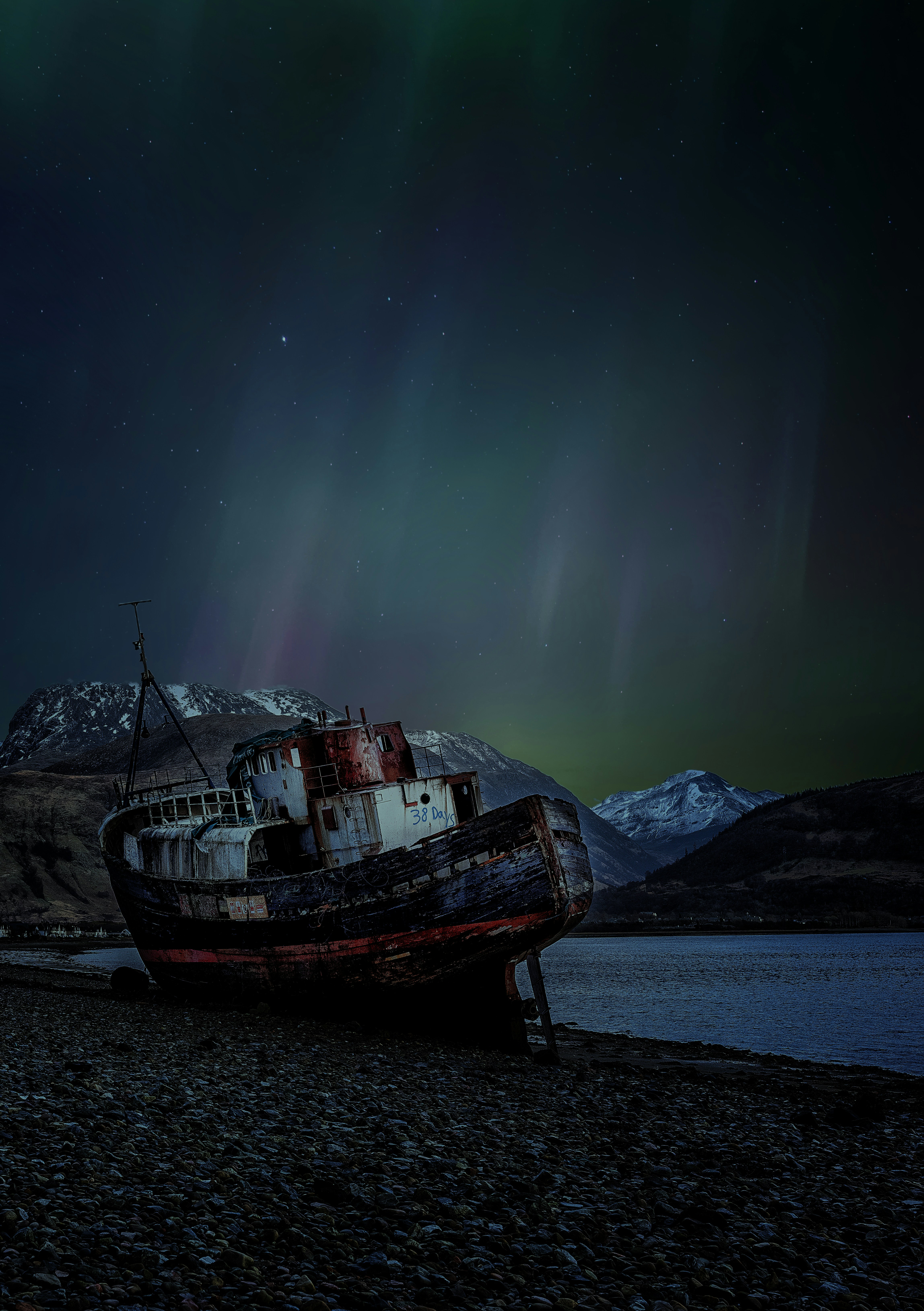 Brown boat on sea shore during night time photo – Free Grey Image on ...