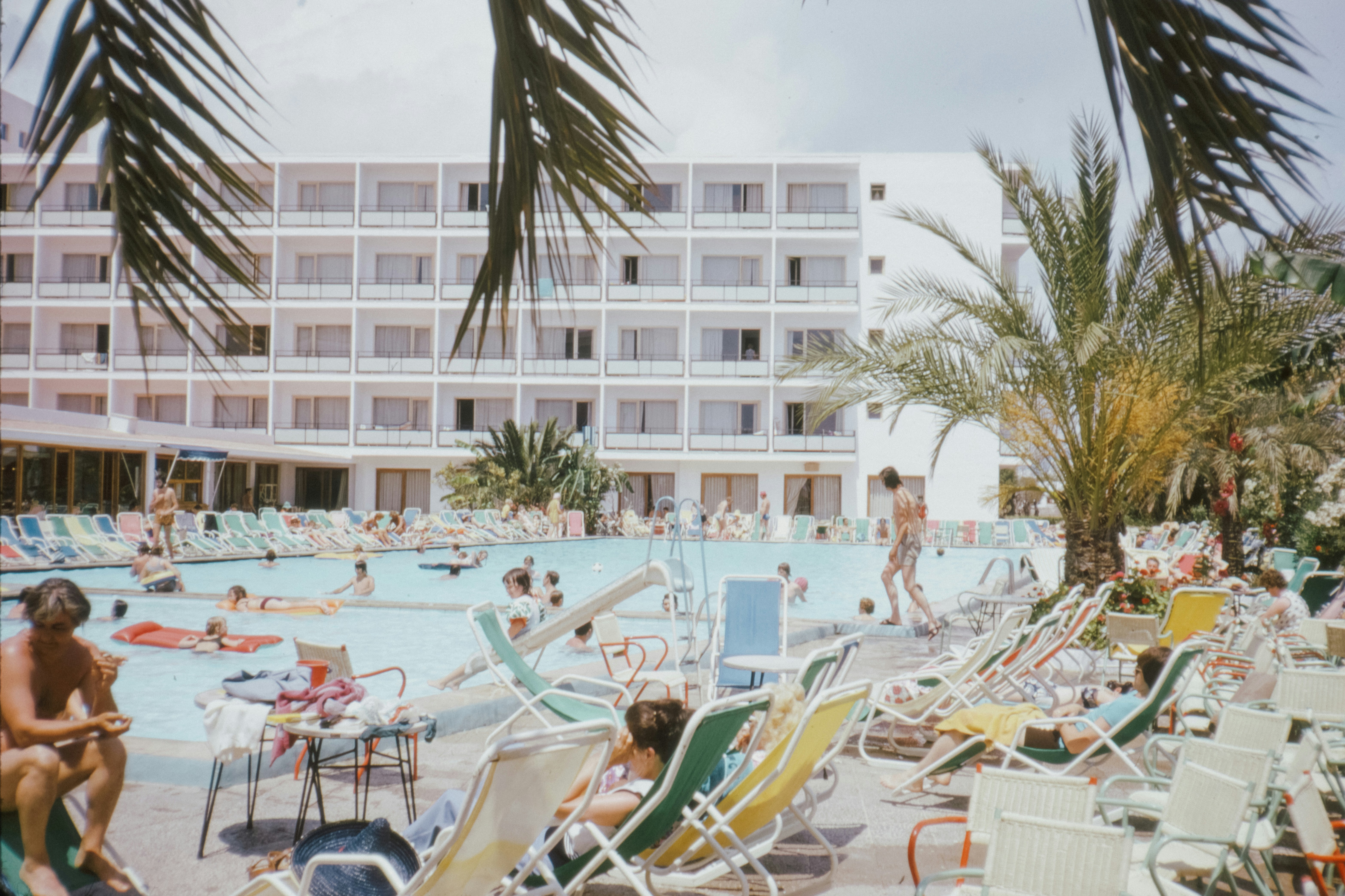 Sunlit Poolside Mosaic at a Retro Resort