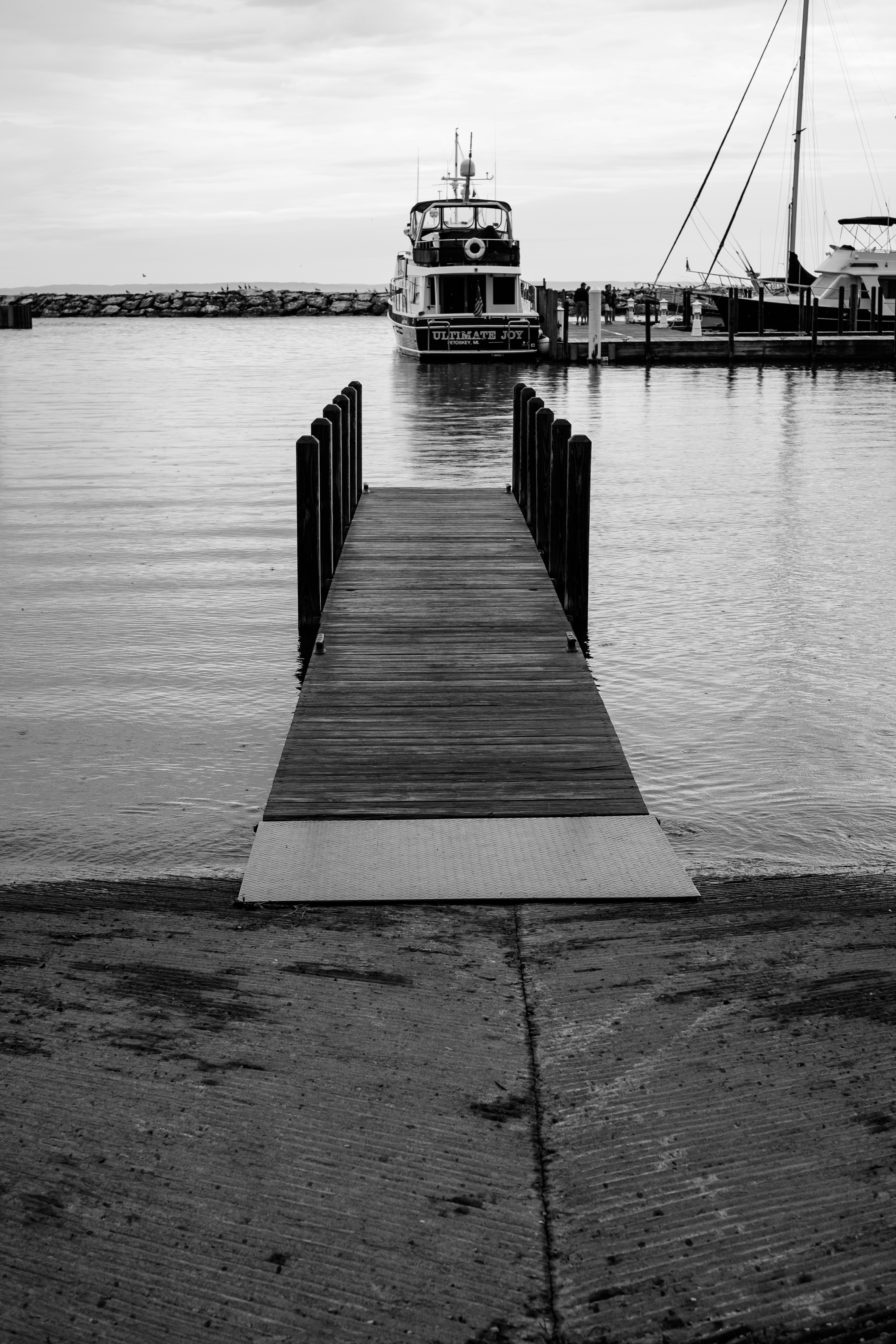 Grayscale photo of wooden dock on body of water photo – Free Grey Image ...