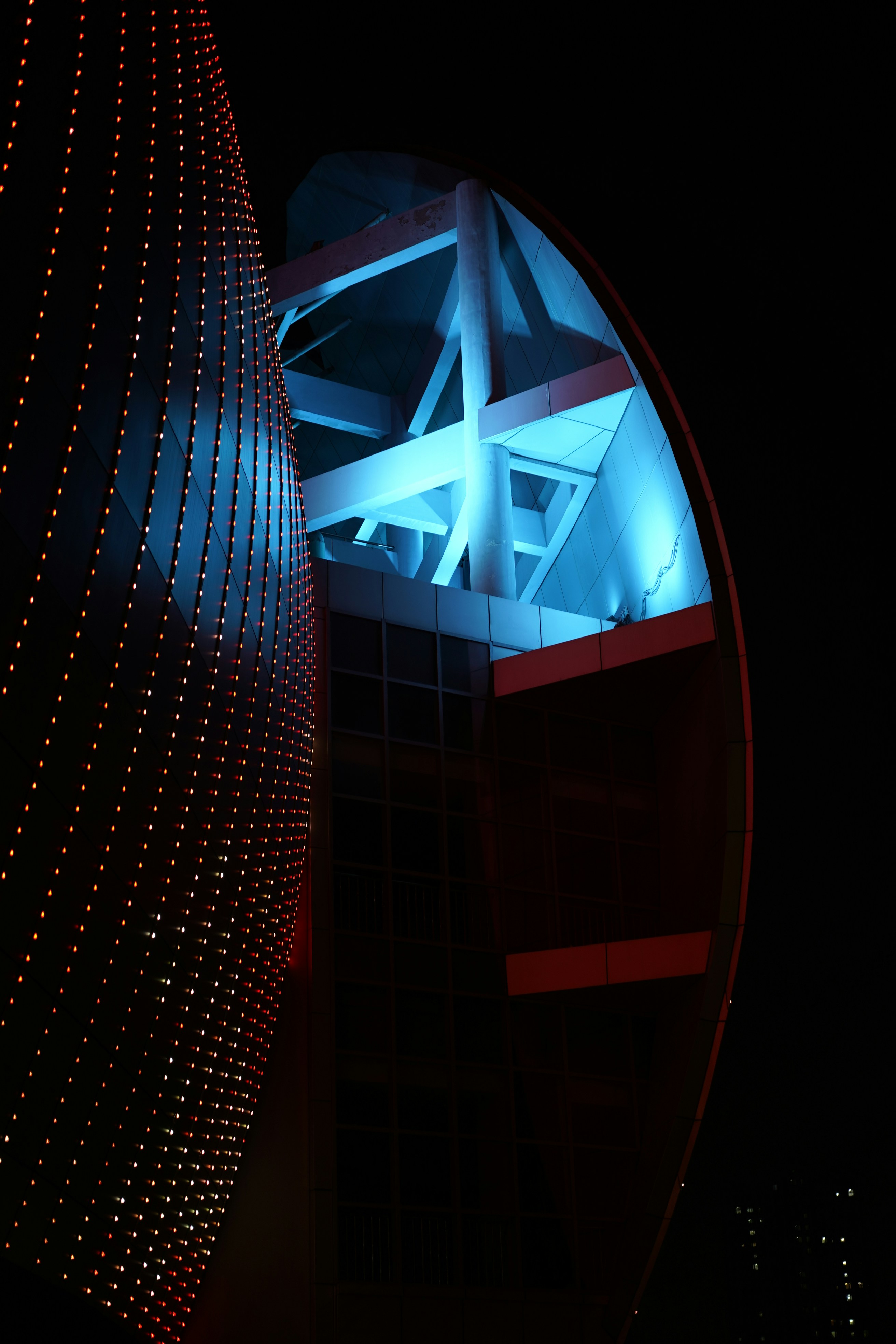 Blue Lattice Under a Night Arch: Neon-Studded Steel Portrait