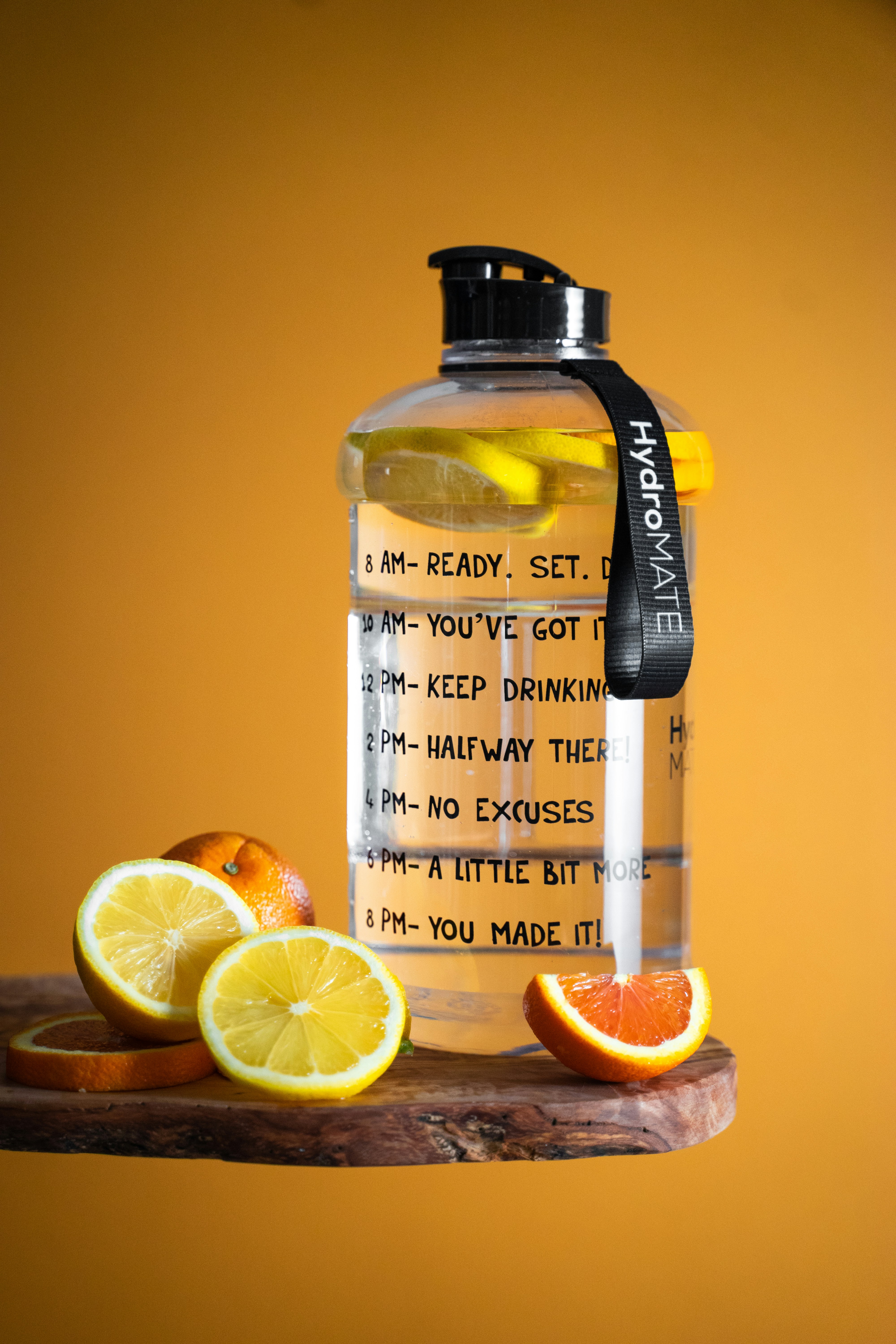 Product photography, water bottle and fruits 