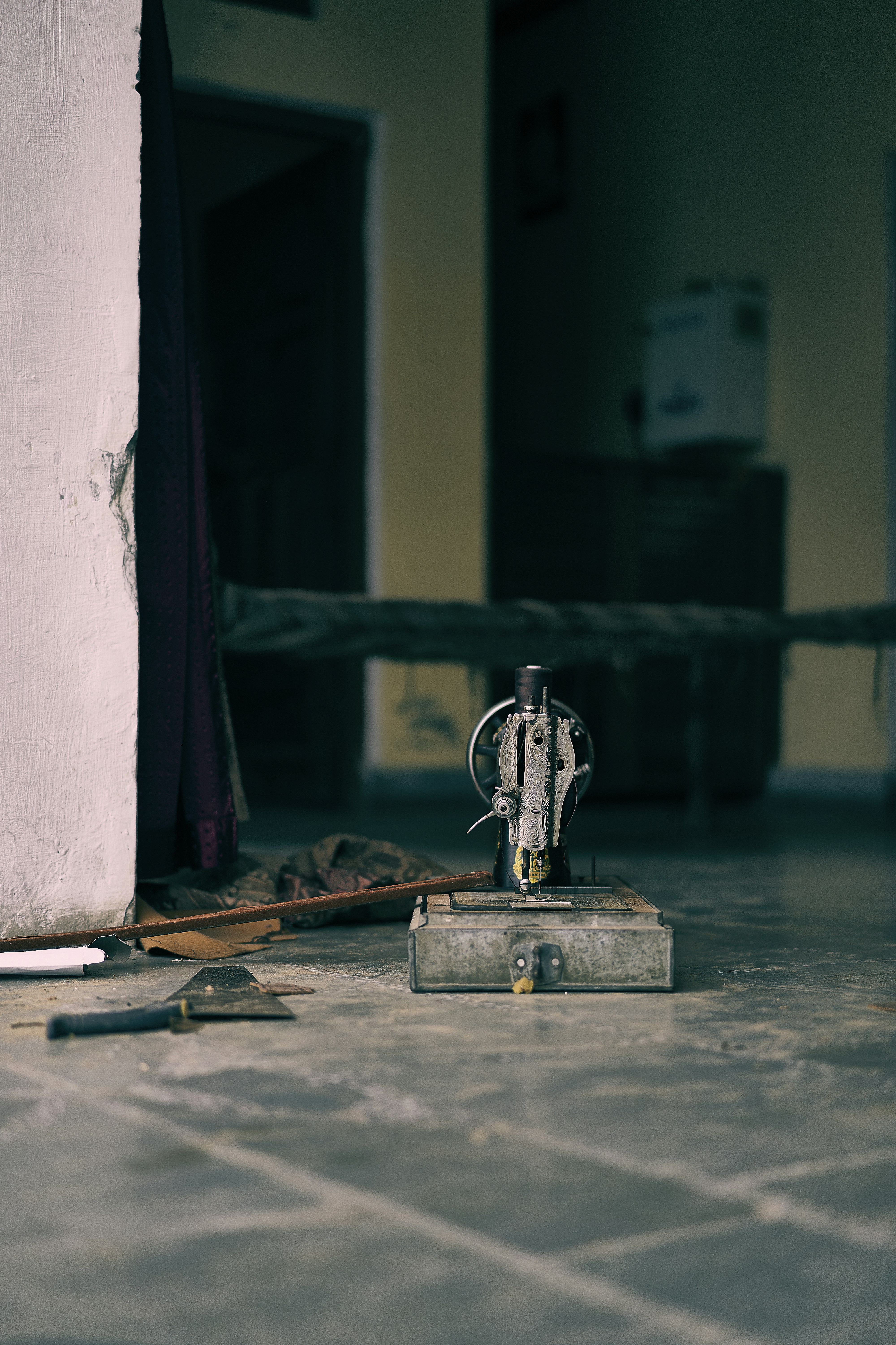 Foot-Pedal Echo: A Quiet Relic on a Dusty Workshop Floor